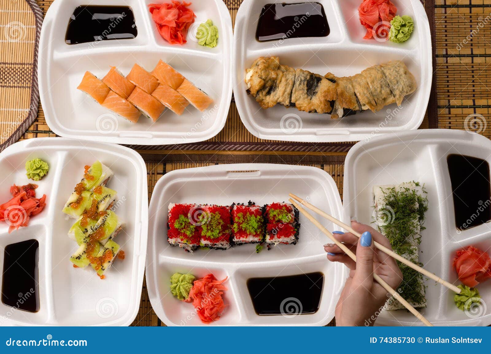 Assorted Sushi and Rolls on the Table Stock Photo - Image of seafood ...