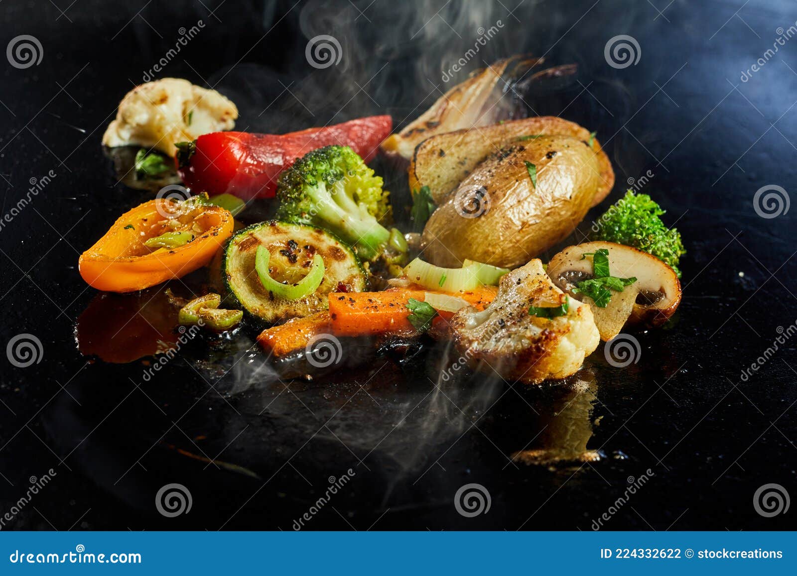 Assorted Vegetables Cooking on Hot Surface Stock Photo - Image of ...