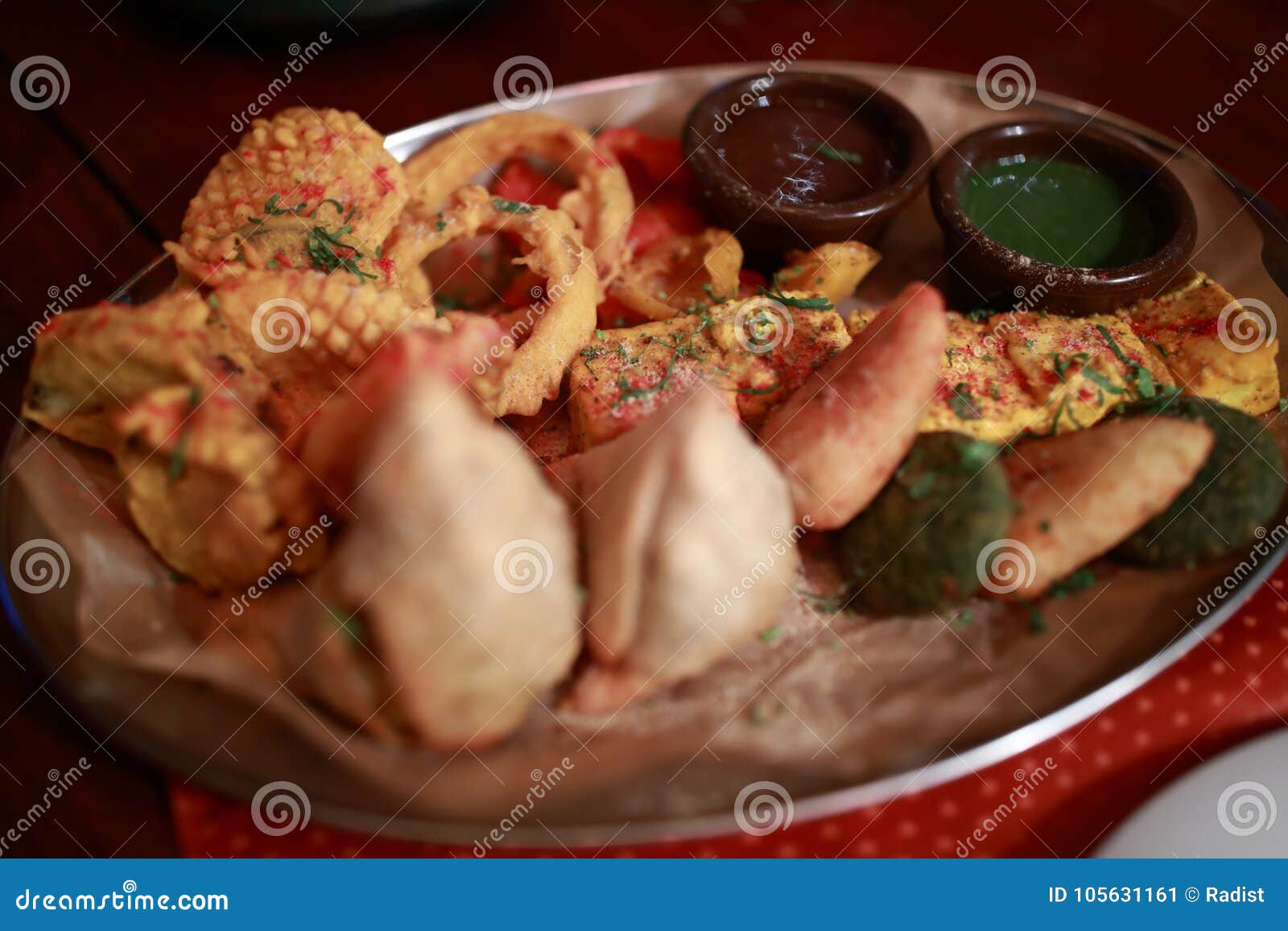Vegetarian Indian Food Or Starters On Metal Plates Including Samosa ...