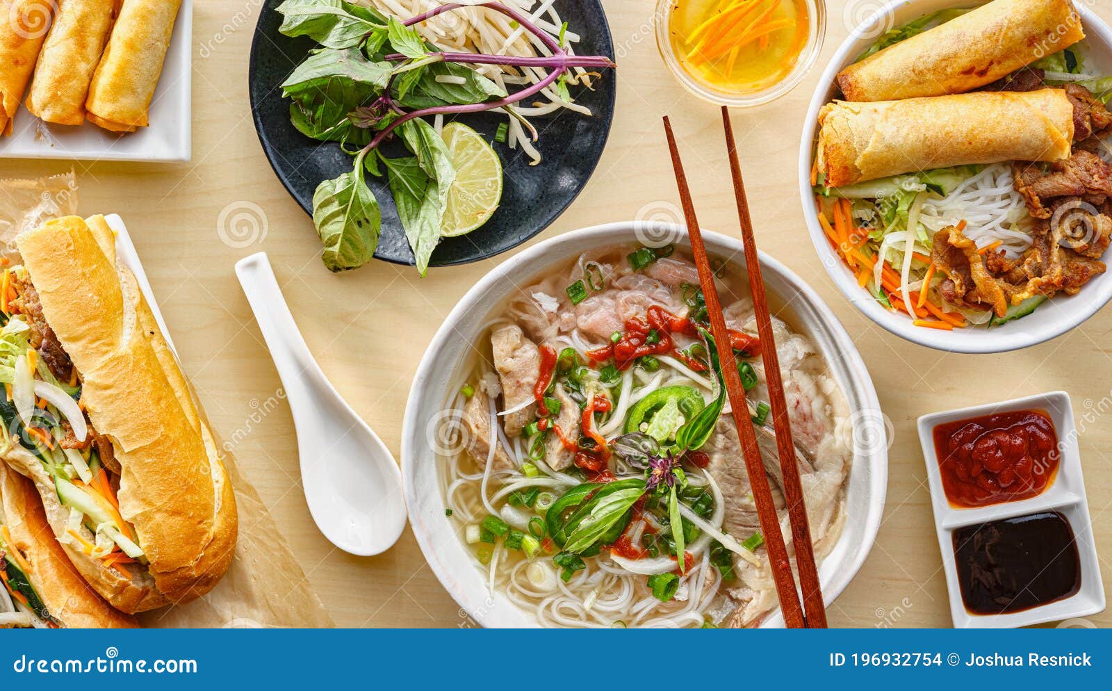 Assorted Vietnamese Dishes with Pho, Bahn Mi, Spring Rolls in Top Down ...