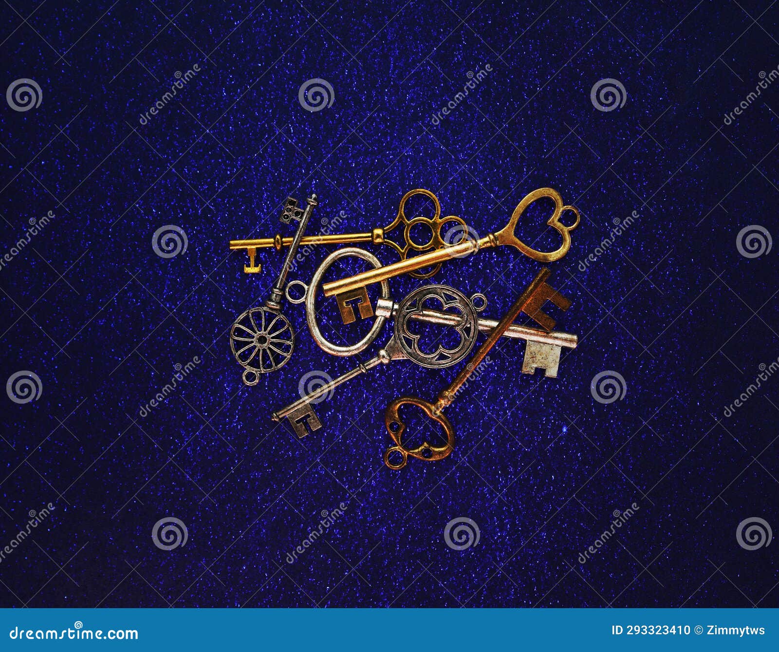 Assorted Vintage Gold and Silver Keys on Blue Background Stock Photo ...