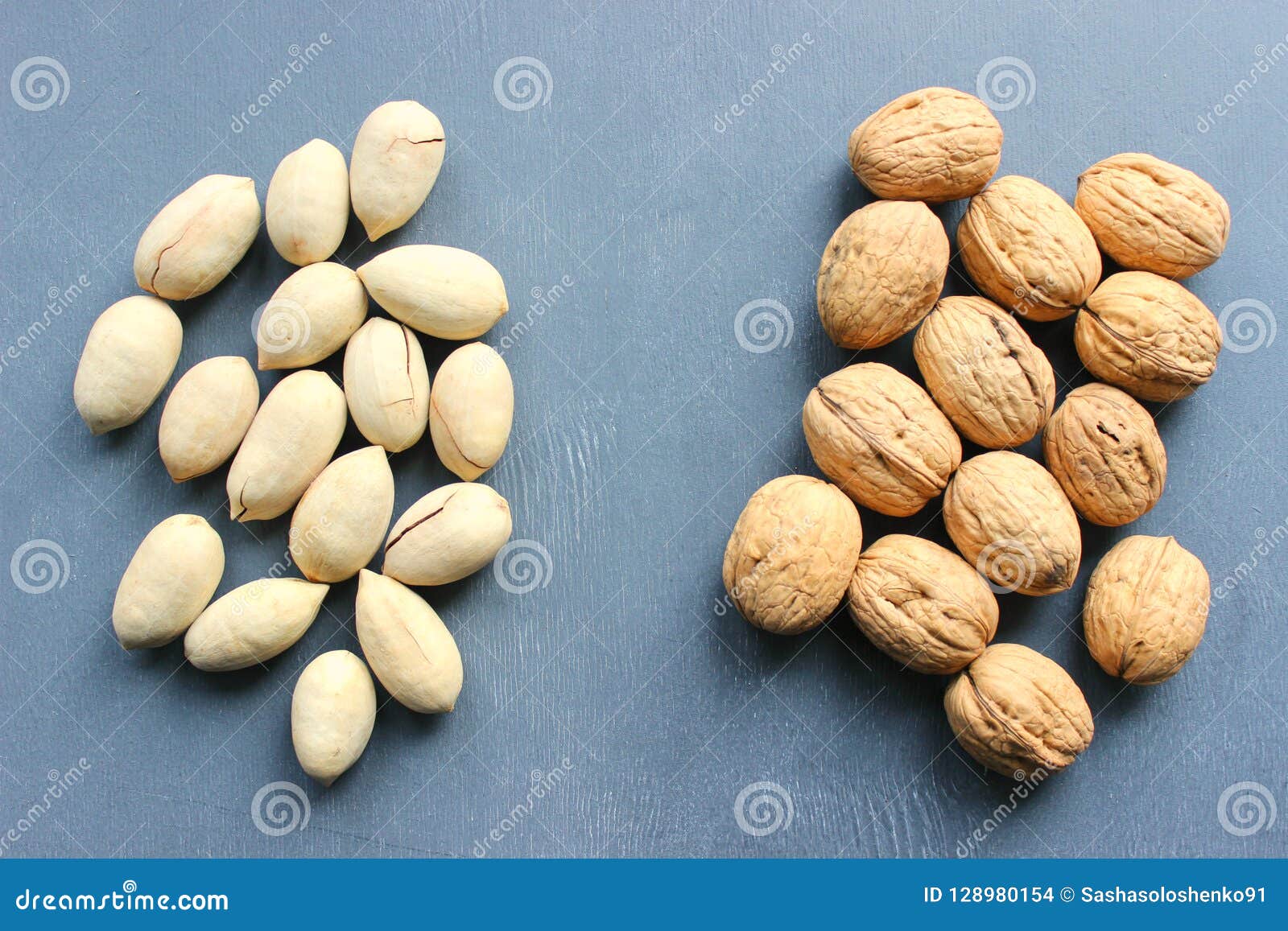 Assorted Walnuts, Macadamia Nuts and Pecans Close-up on Wooden Table ...