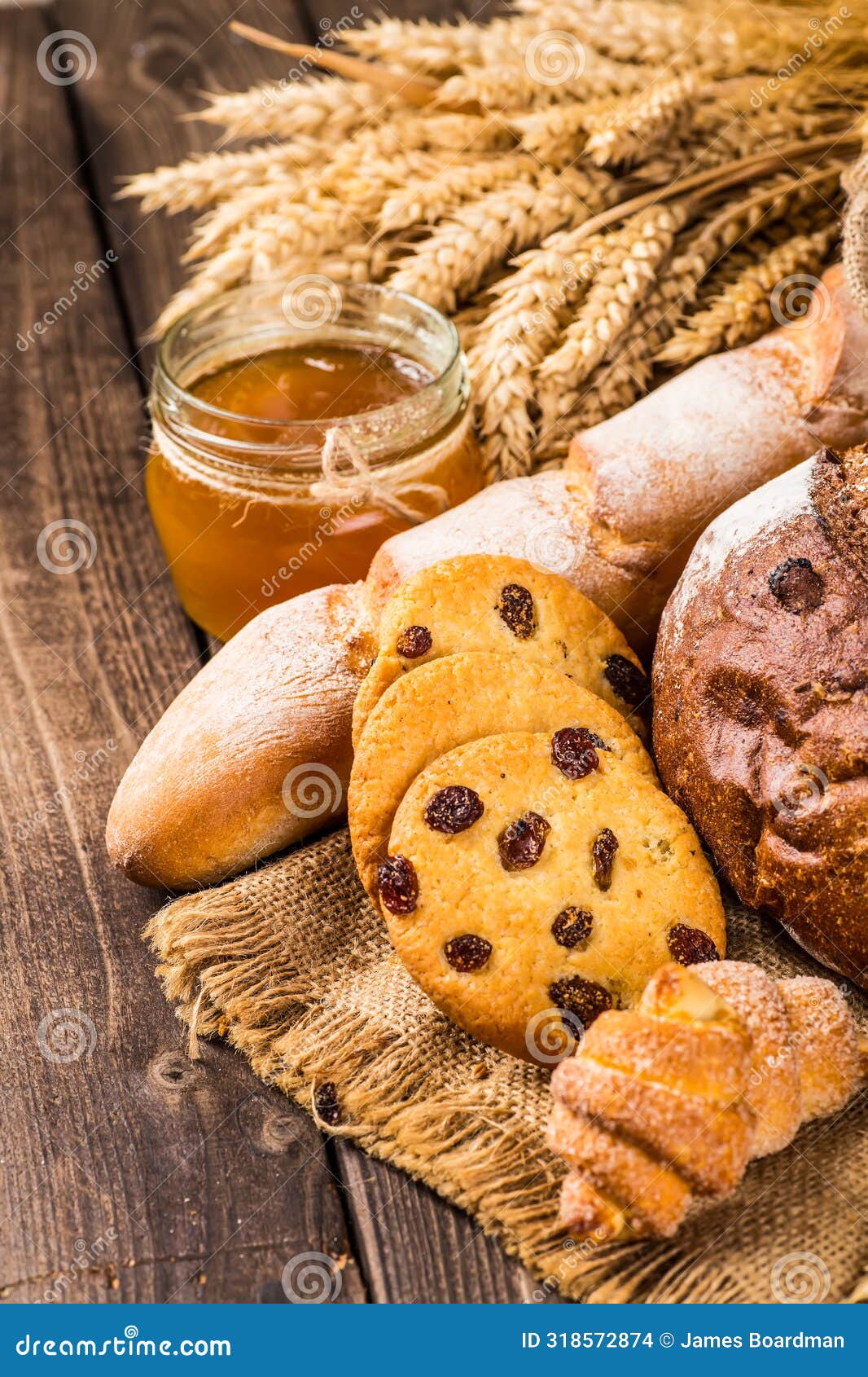 Assortment of Baked Bread on Wood Table Stock Photo - Image of bake ...