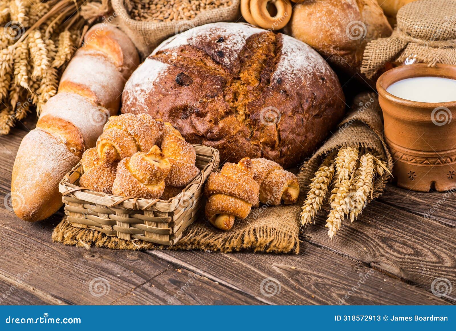 Assortment of Baked Bread on Wood Table Stock Image - Image of warm ...