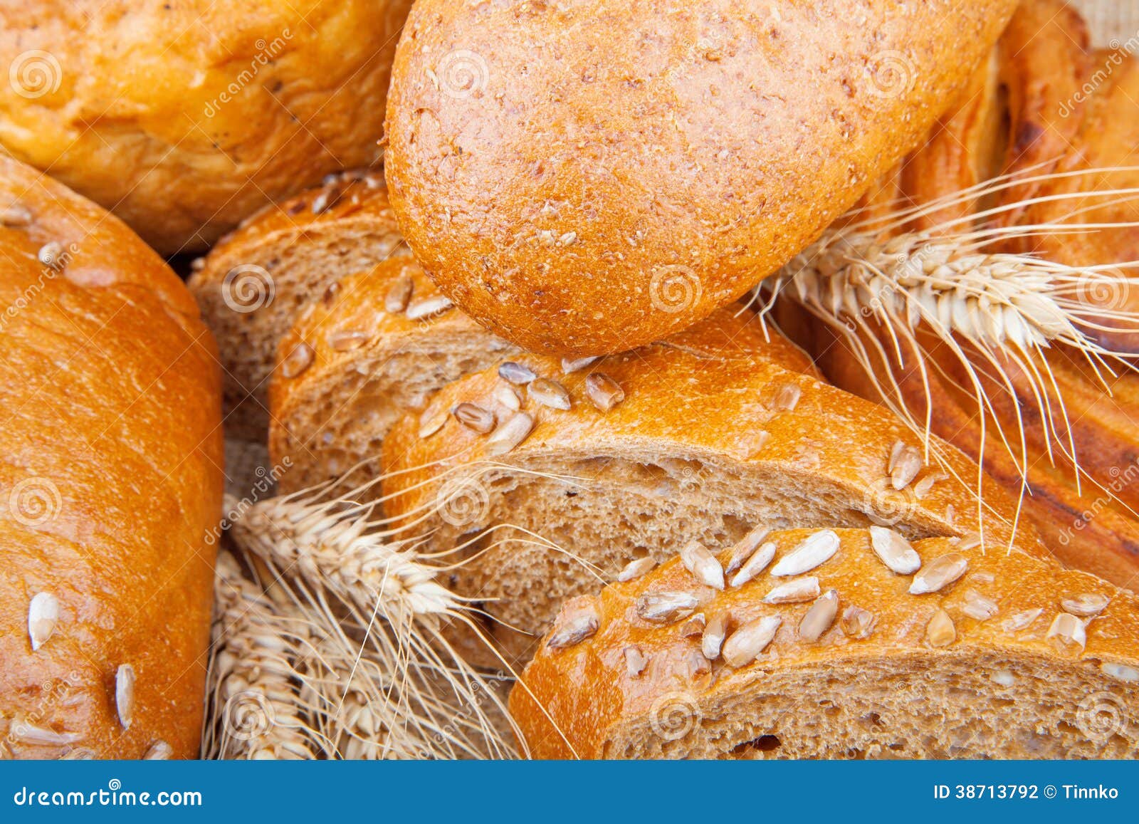 Assortment of baked breads stock photo. Image of seed - 38713792
