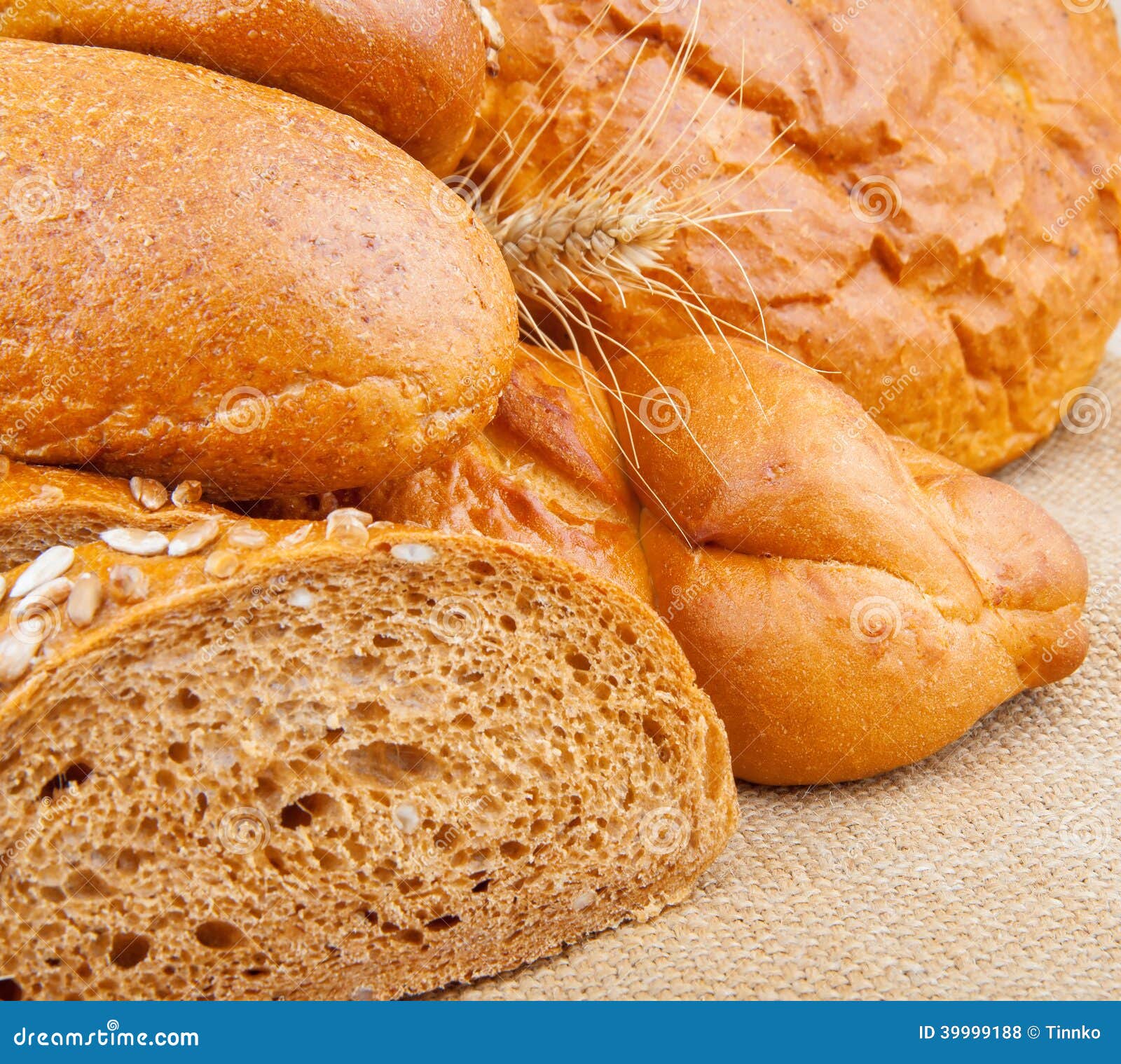 Assortment of baked breads stock photo. Image of seed - 39999188