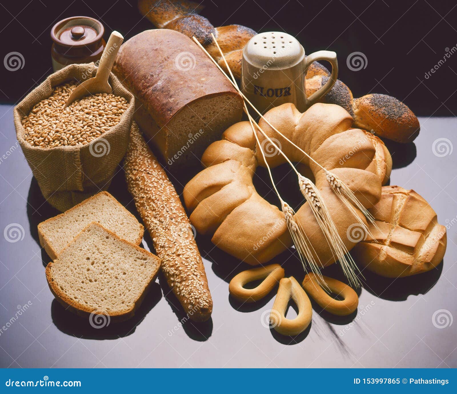 Assortment of Baked Breads and Wheat Grains. Stock Image - Image of ...