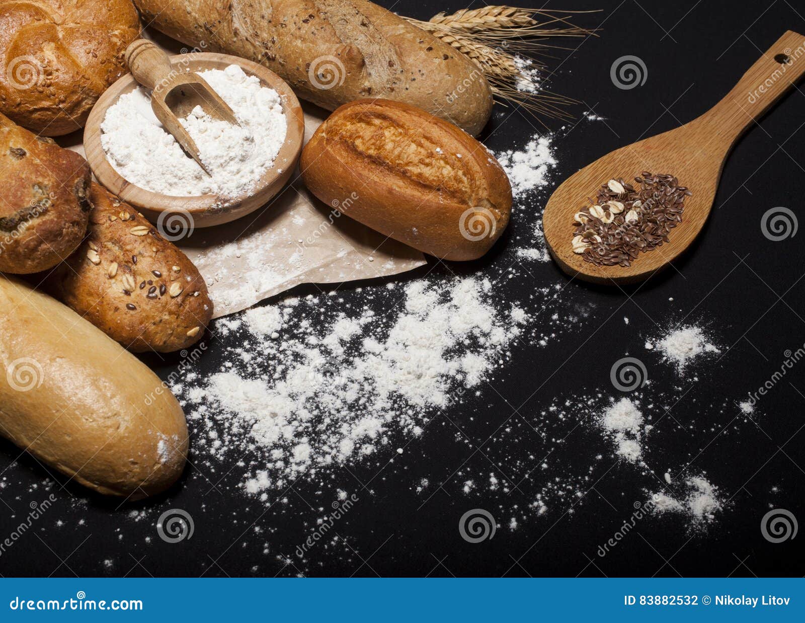 Assortment of Baked Goods on Black Table Stock Photo - Image of ...