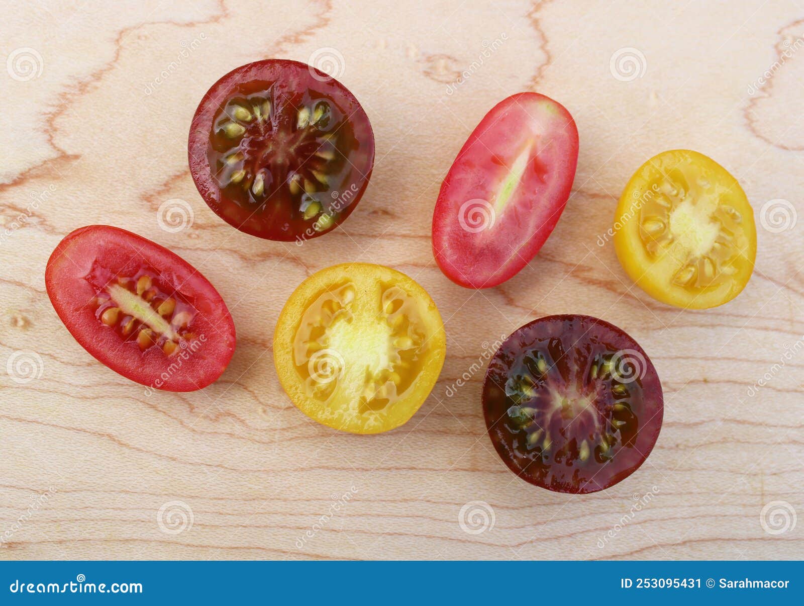 An Assortment of Cherry and Plum Tomato Halves Stock Image - Image of ...