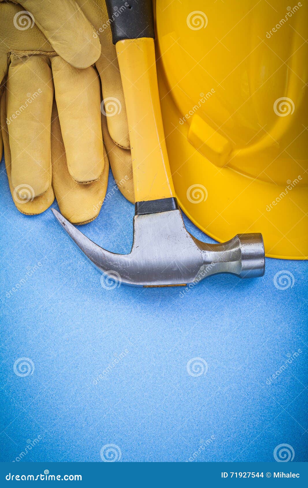 Assortment of Claw Hammer Safety Gloves Hard Hat on Blue Backgro Stock ...