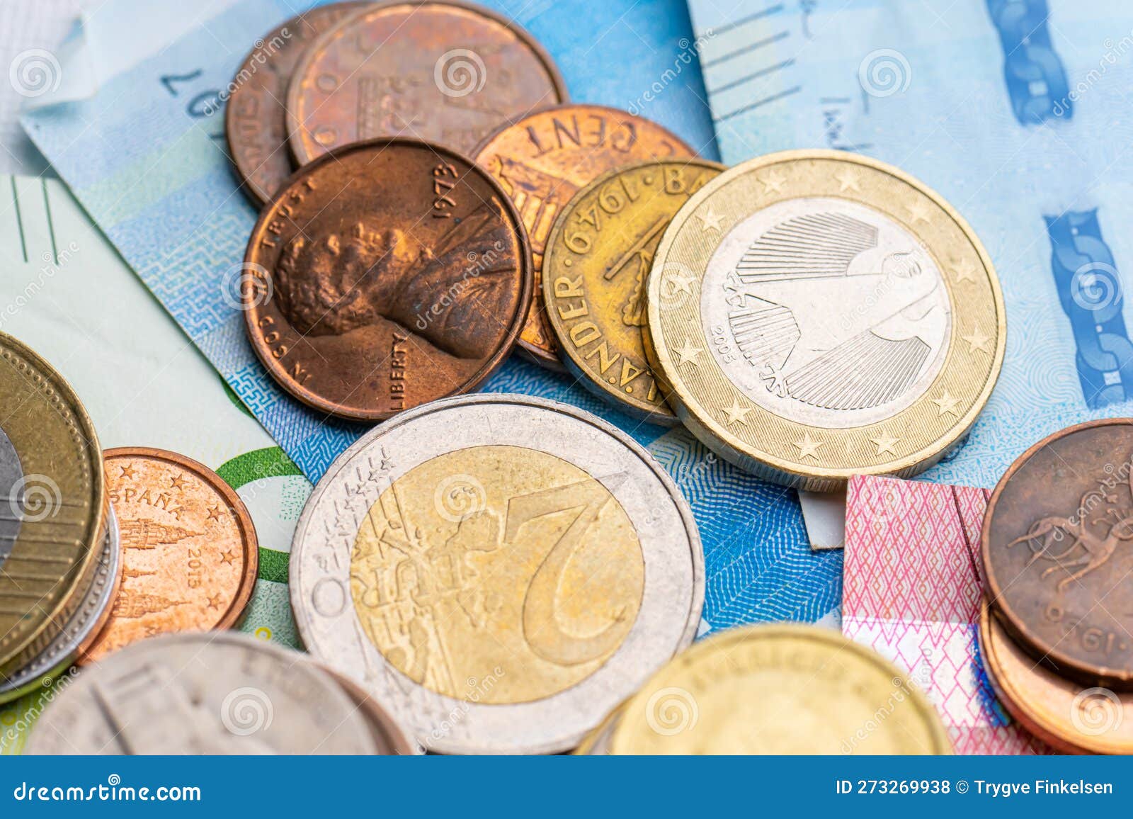 Assortment of Coins on Bank Notes from Different Countries.. Stock ...