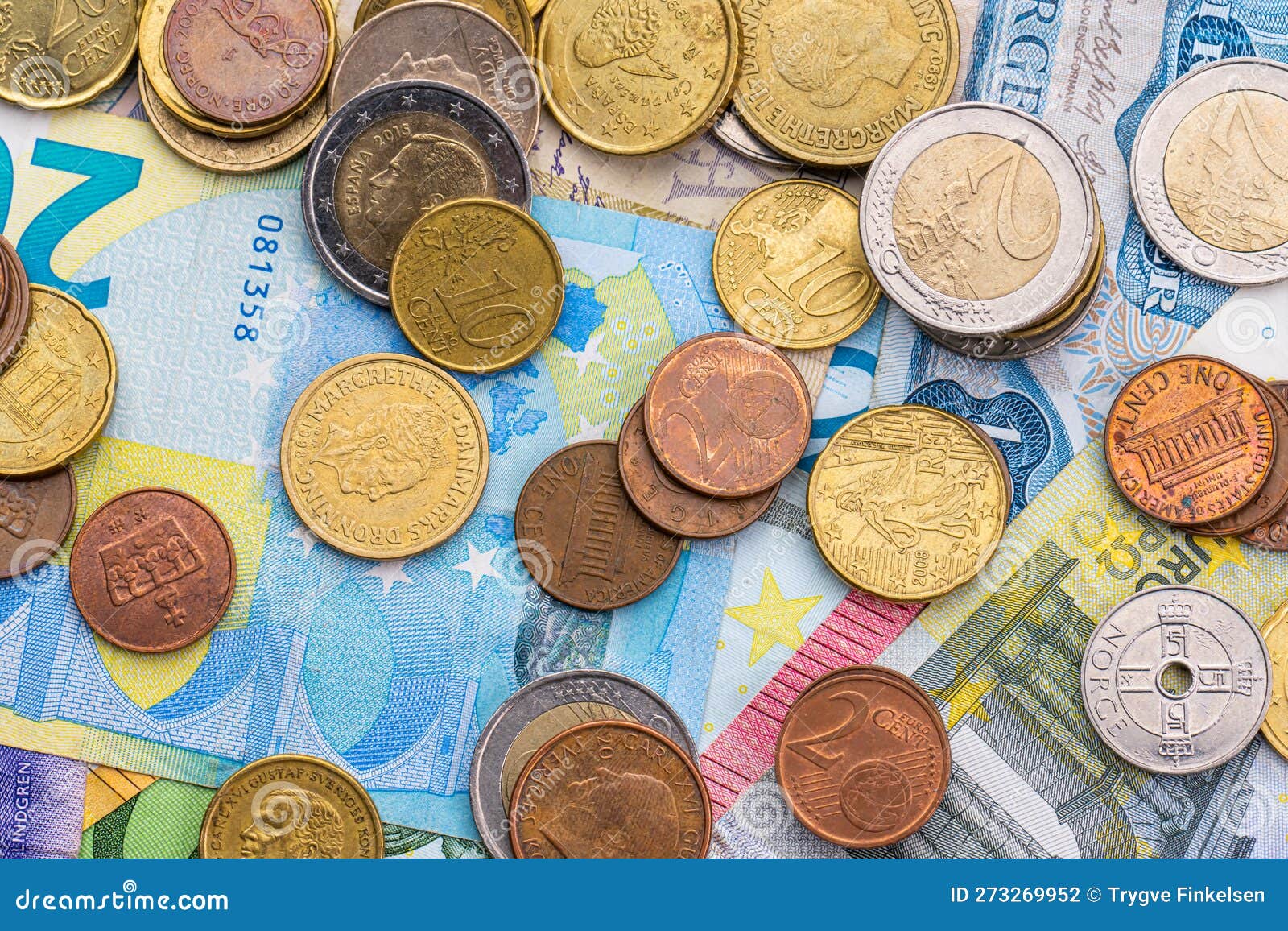 Assortment of Coins on Bank Notes from Different Countries.. Stock ...