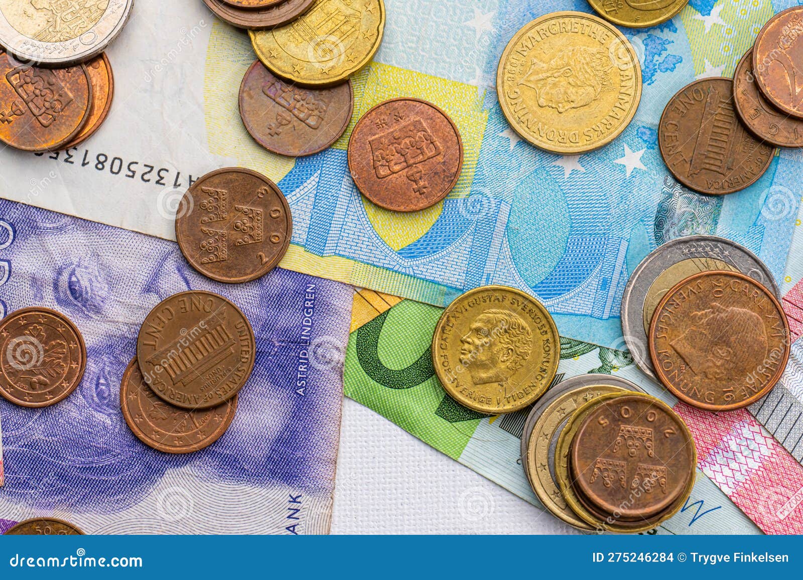 Assortment of Coins on Bank Notes from Different Countries.. Stock ...