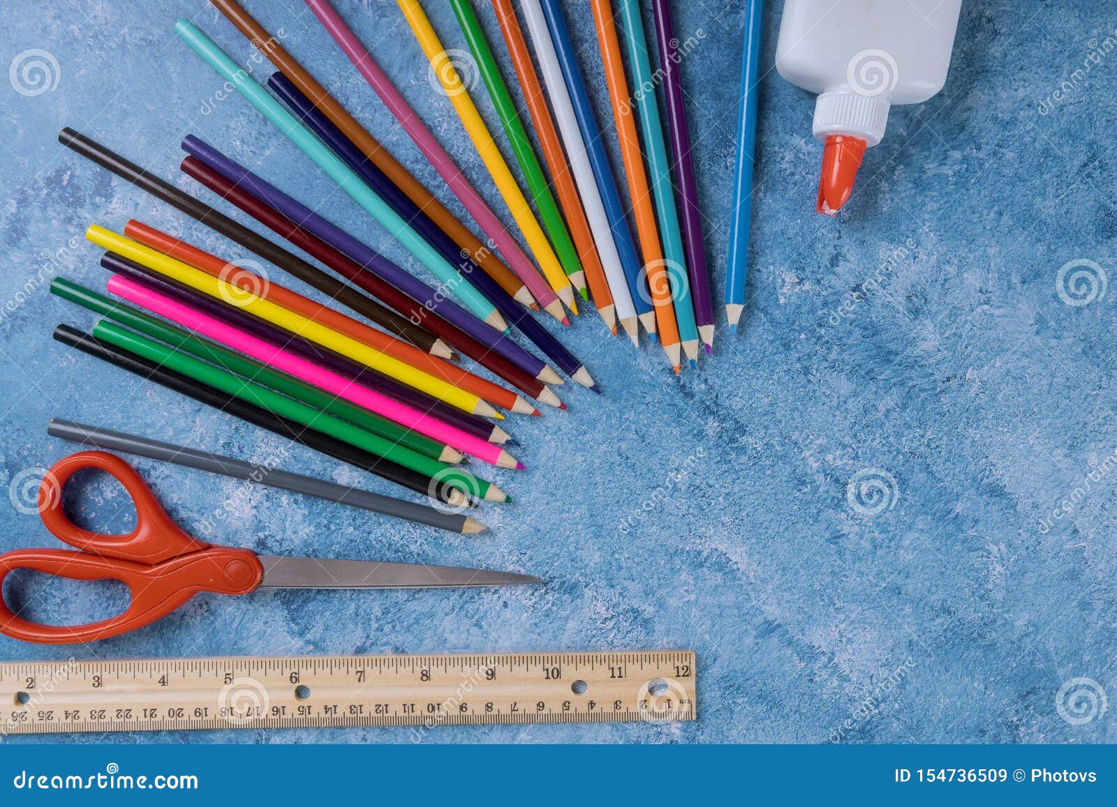 Assortment of Colored Pencils, Ruler, Glue and Scissors Stock Image ...