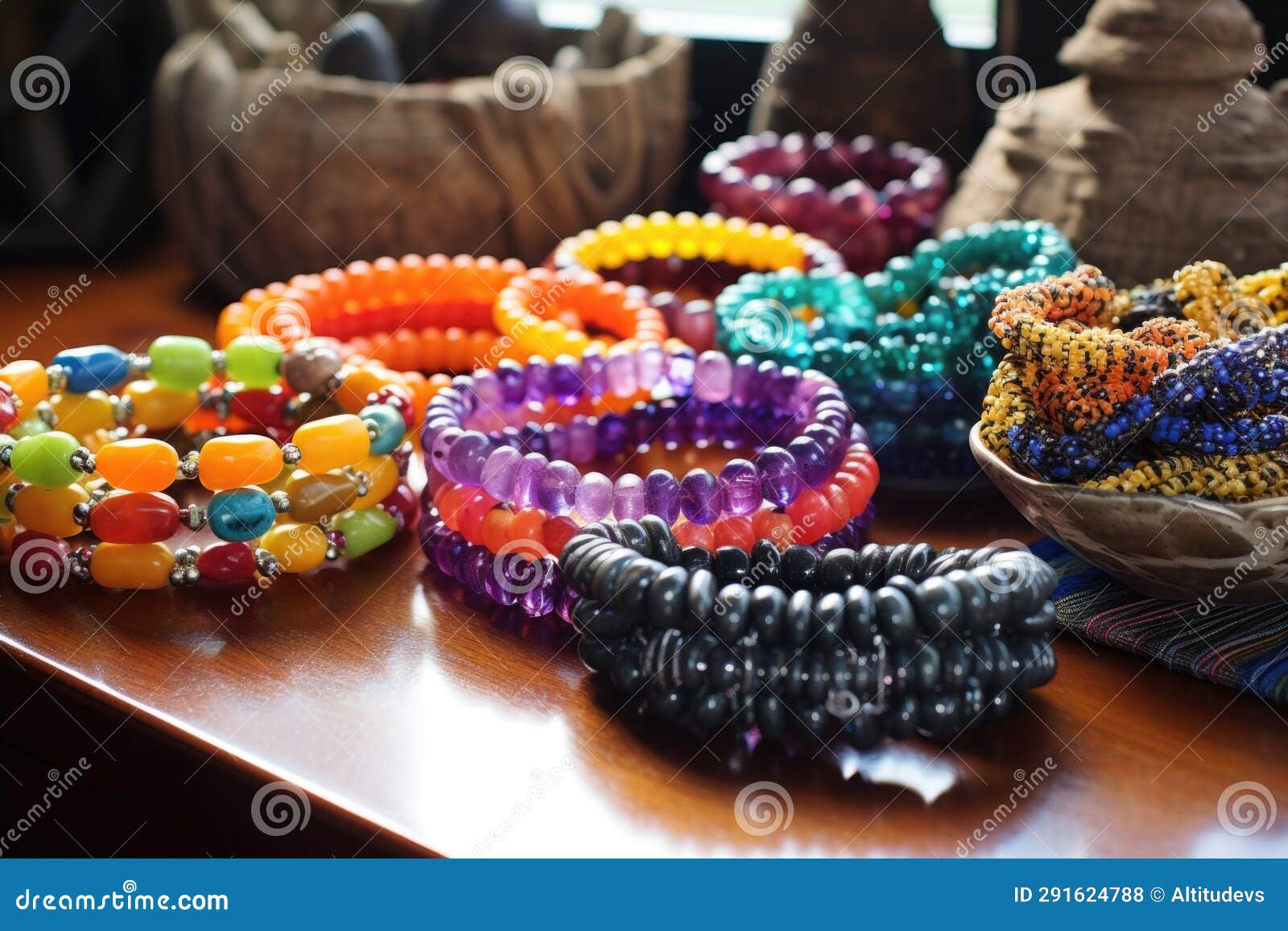 An Assortment of Colorful Beaded Bracelets Spread on a Table Stock ...