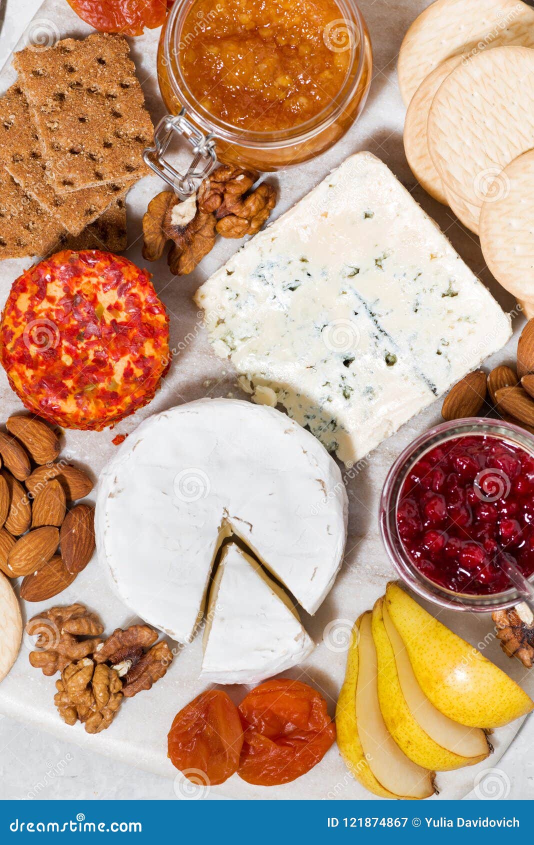 Assortment of Delicacy Cheeses and Snacks, Vertical Composition Stock ...
