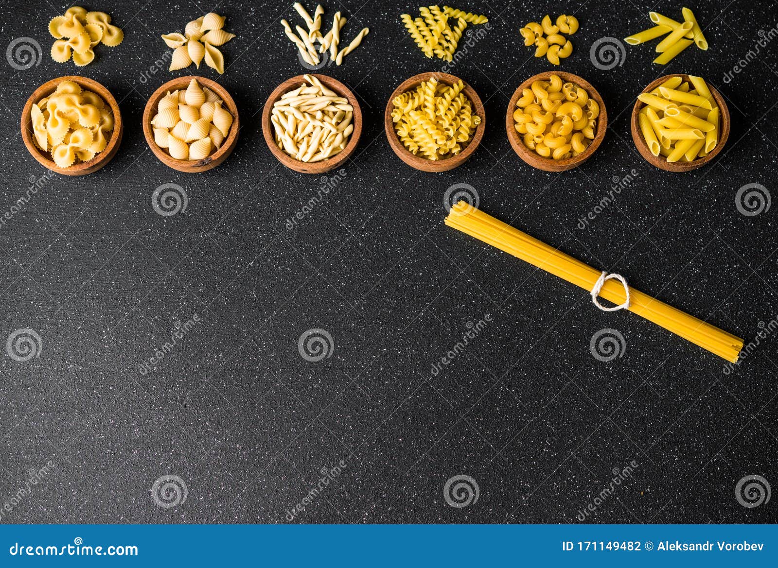 Assortment of Different Dry Pasta Types Against Black Background, Top ...