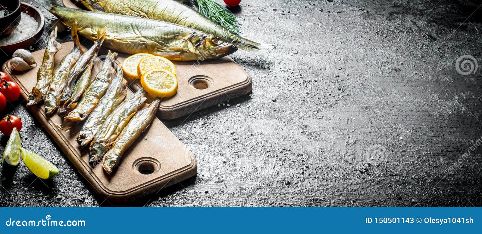 Assortment of Different Kinds of Smoked Fish on Cutting Boards Stock ...