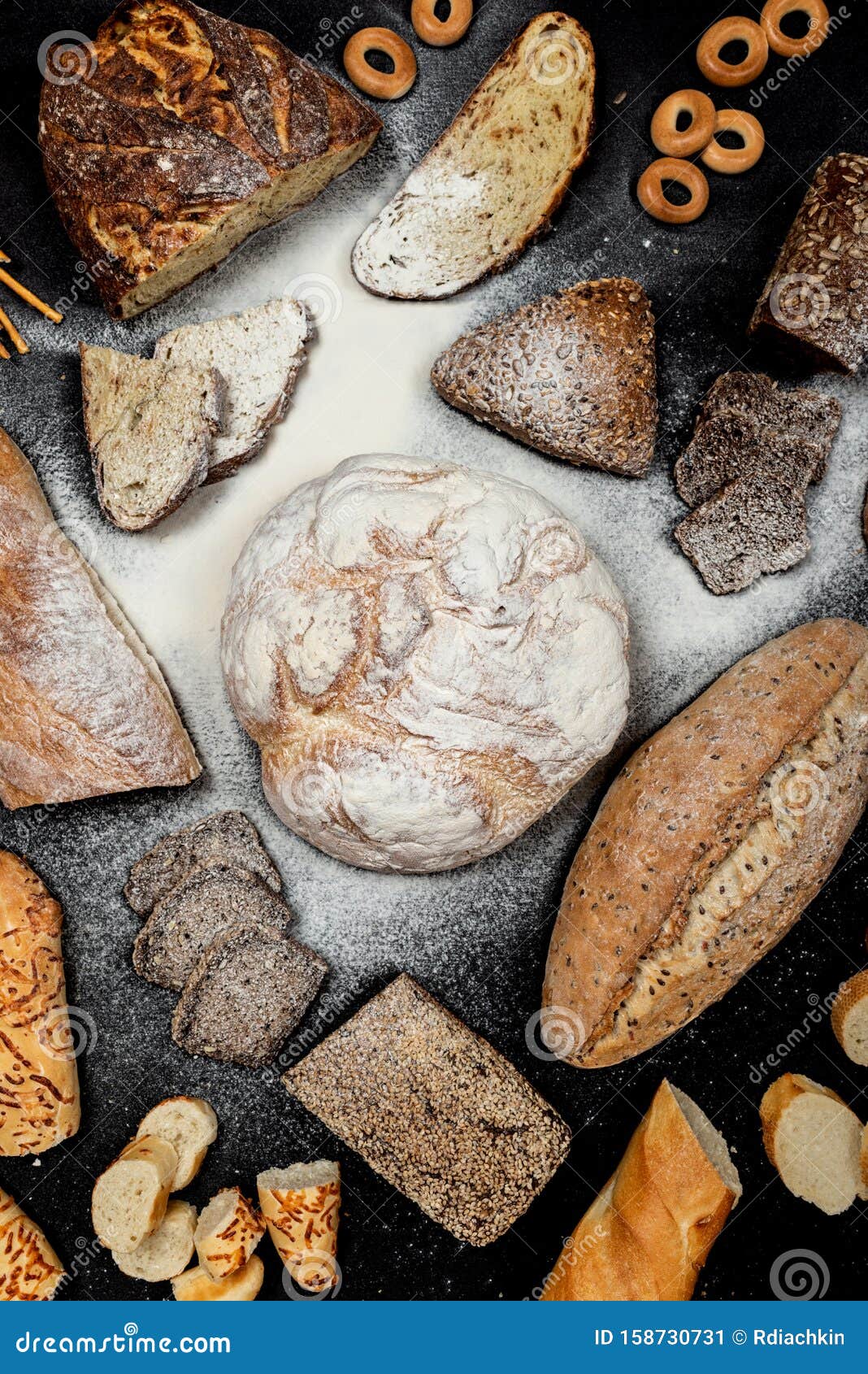 Assortment of Different Types of Bread on a Black Background. Top View ...