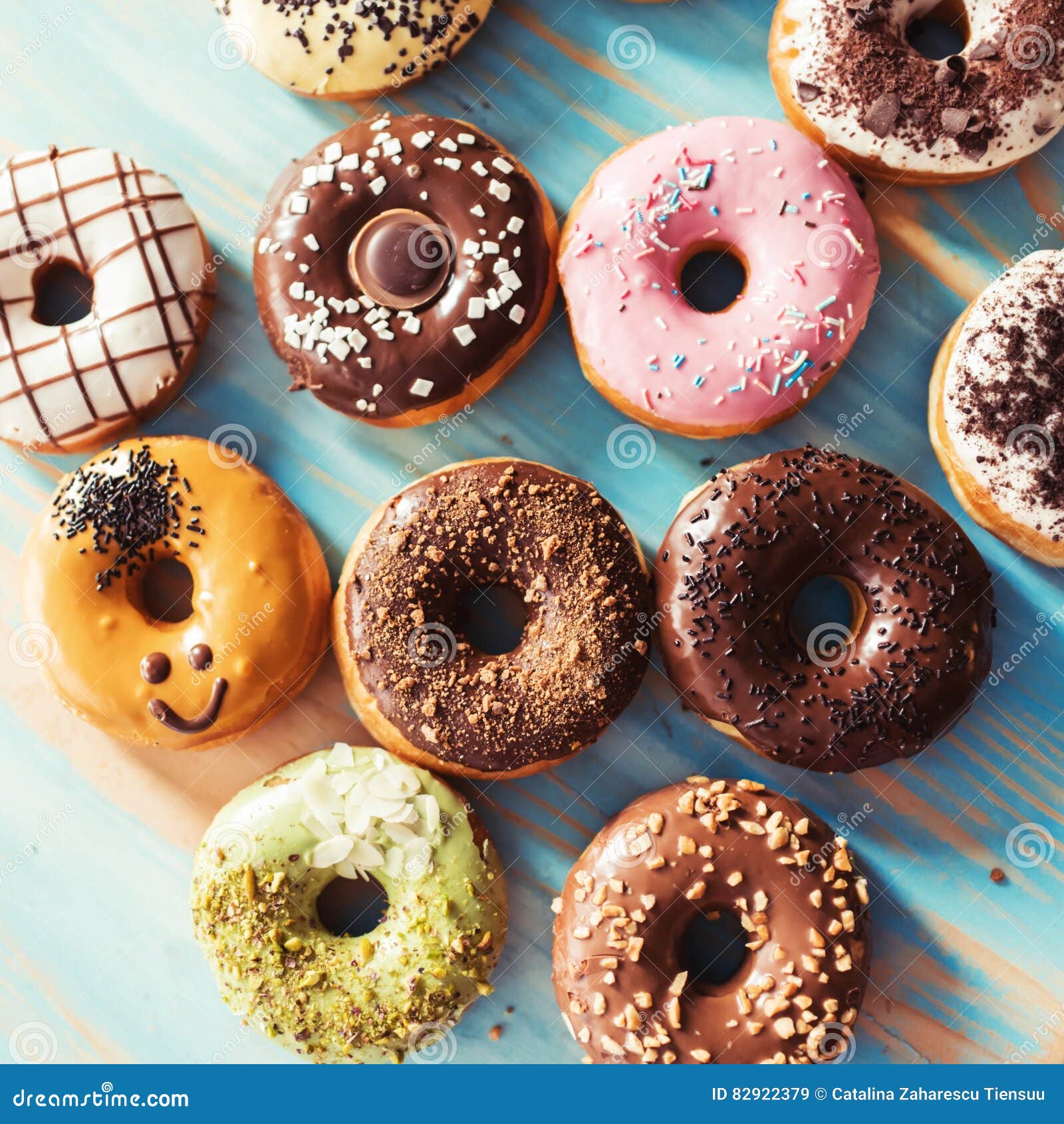 Assortment of Donuts on a Table Stock Image - Image of colored, caramel ...