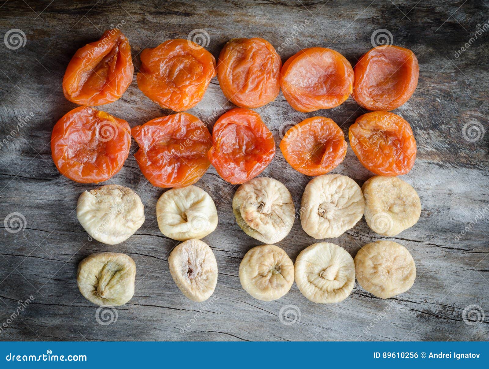 Assortment of Dried Apricots and Figs on Aged Wood. Stock Photo - Image ...