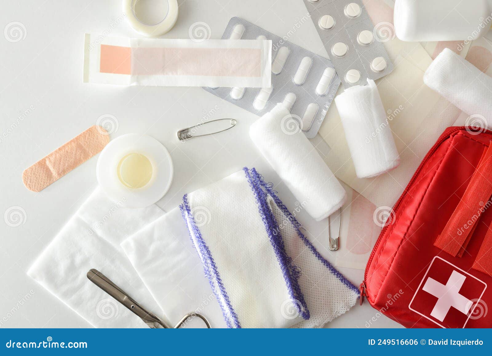 Assortment of Emergency First Aid Kit Objects on White Table Stock ...