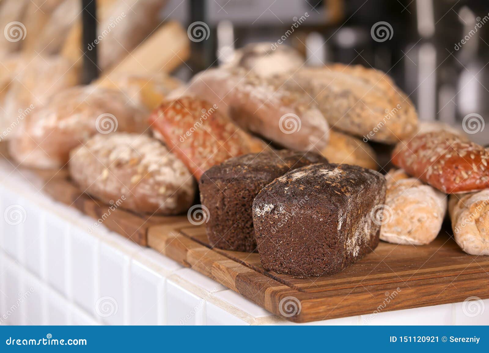 Assortment of Fresh Bread on Counter in Bakery Stock Image - Image of ...