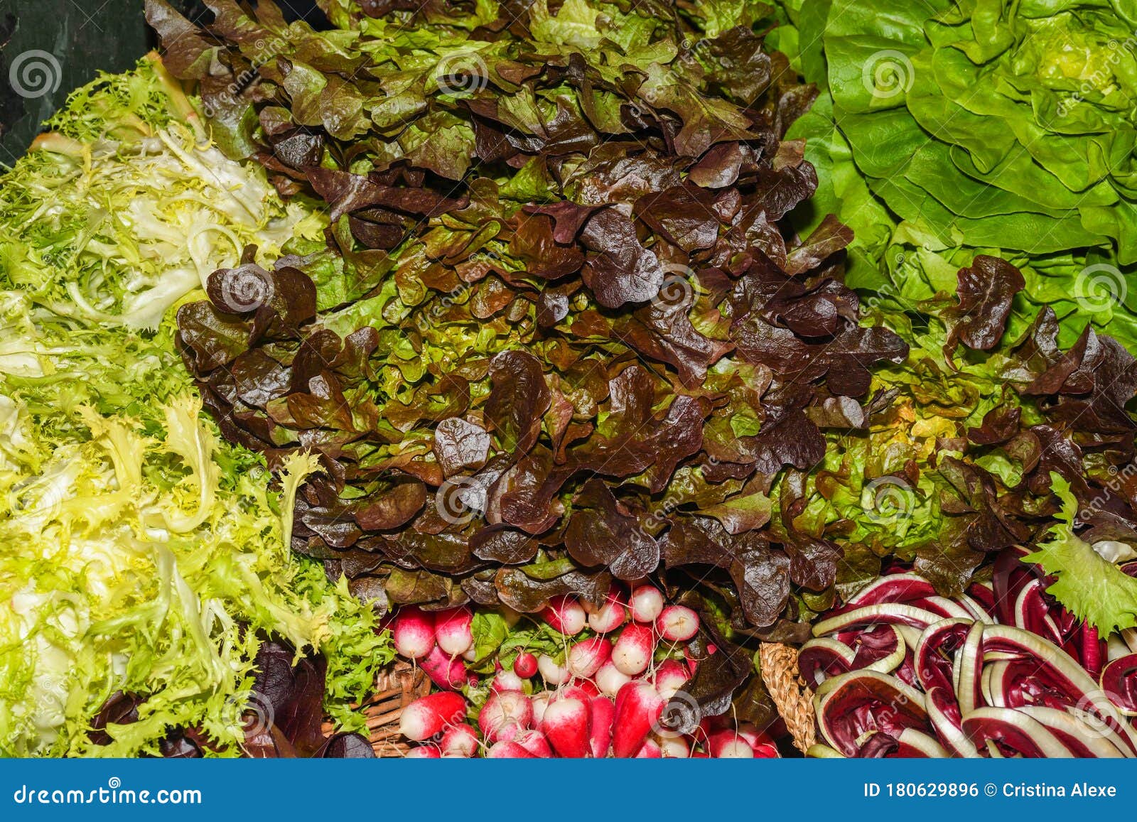 Assortment of Fresh Salads and Vegetables at the Market Stock Photo ...