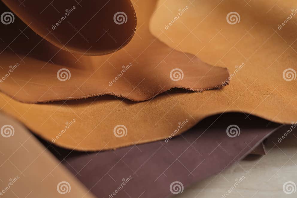 Assortment of High-quality Natural Leather Samples, Emphasizing the ... Assortment of High-quality Natural Leather Samples, Emphasizing the ...