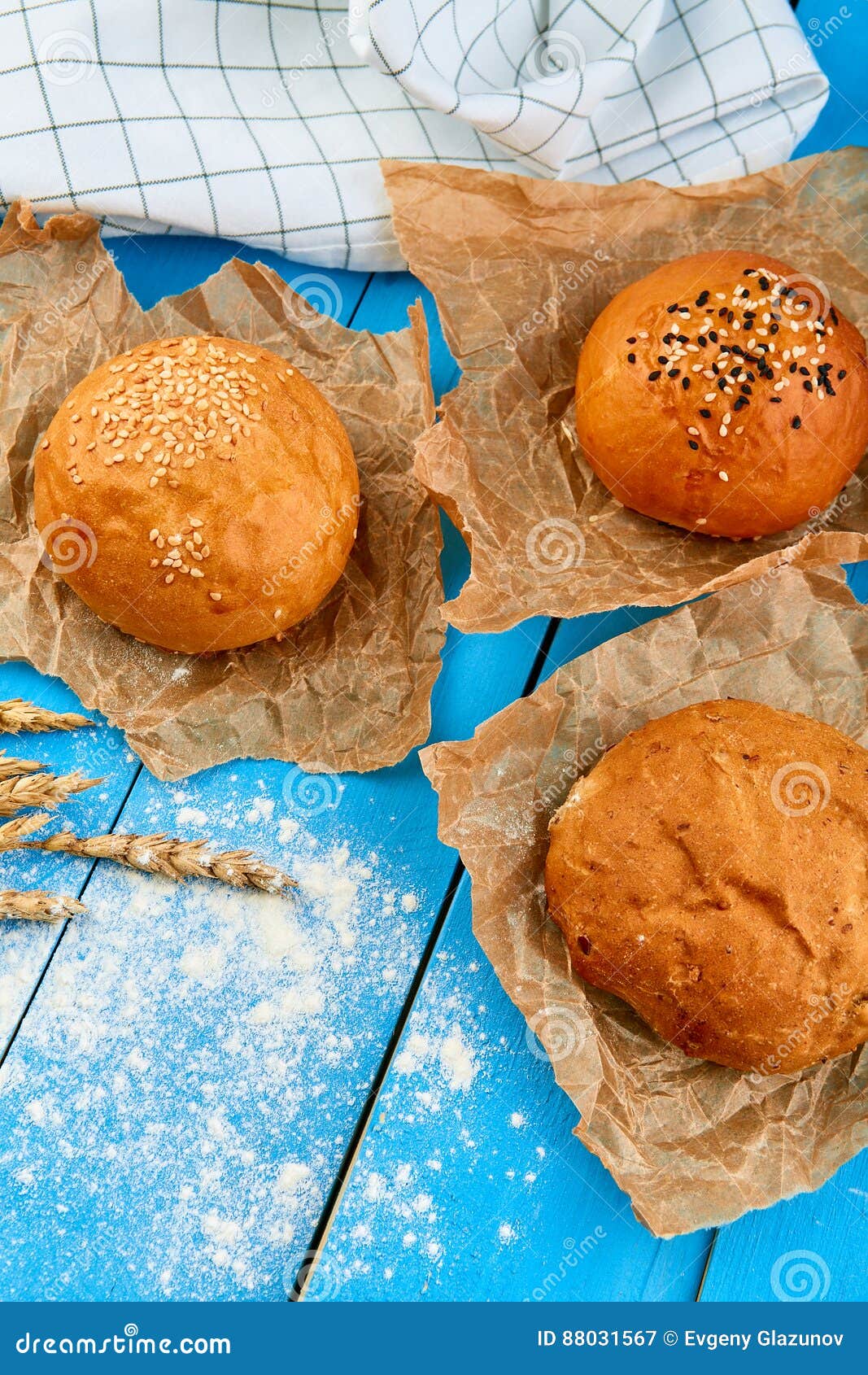 Assortment of Multi-grain Bread Rolls on on Blue Wooden Table Stock ...