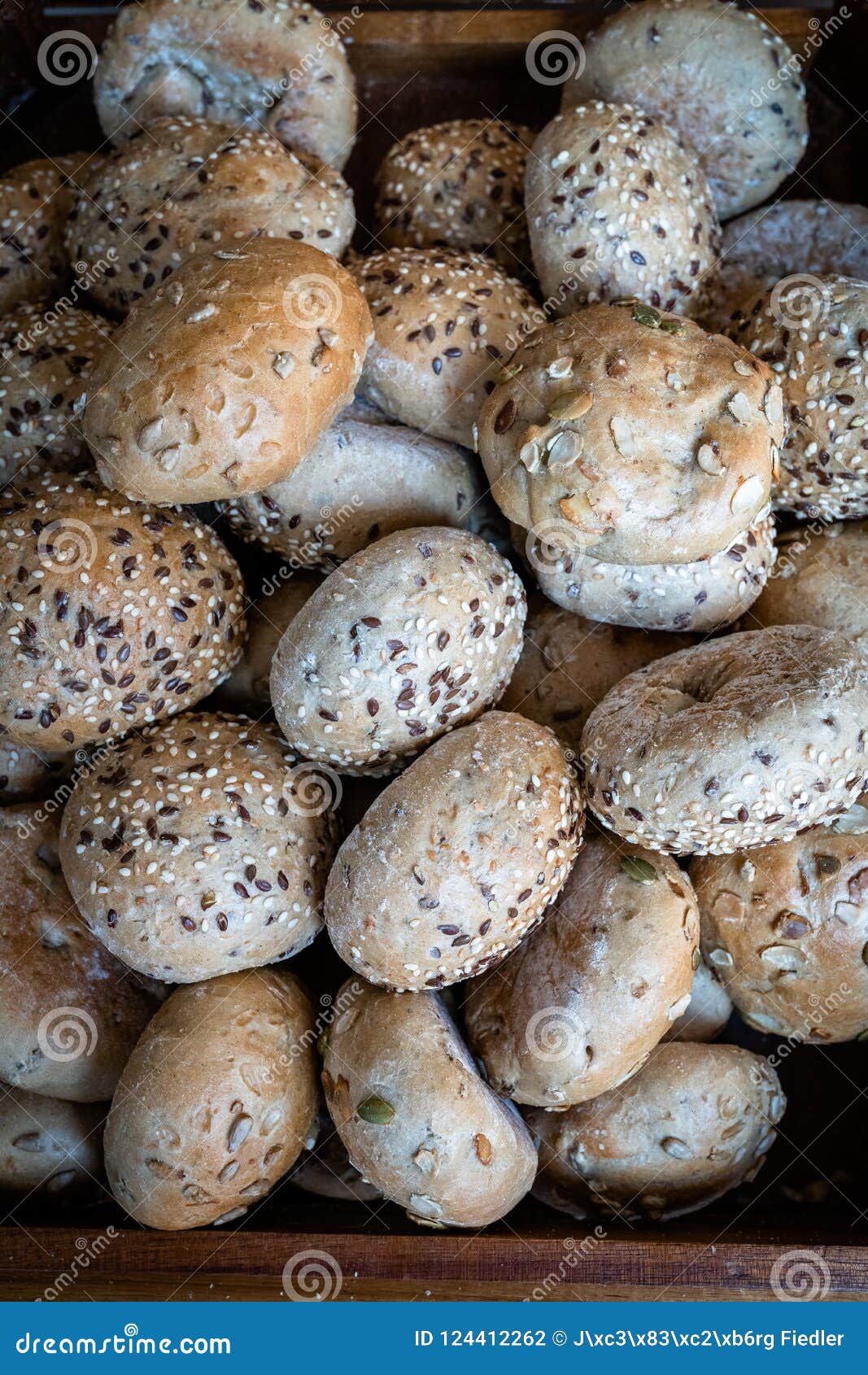 Assortment of Multigrain Buns on on Old Wooden Table Stock Photo ...