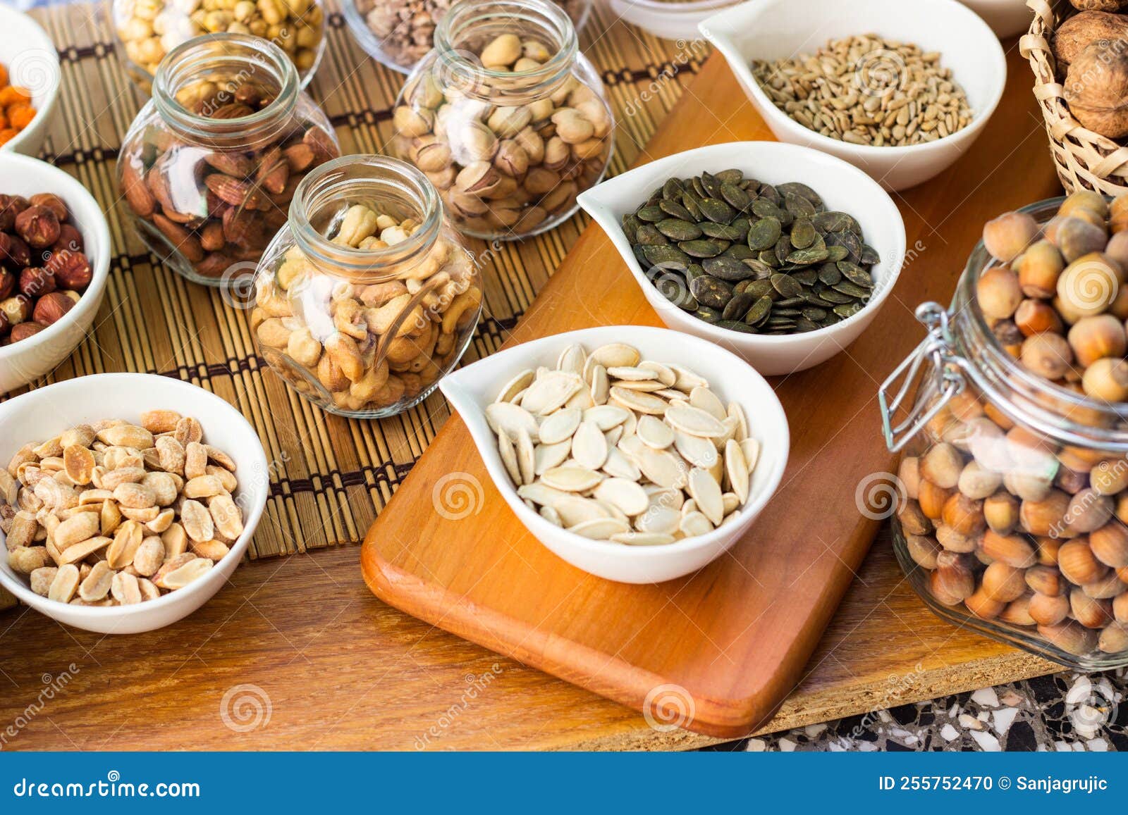 Assortment of Nuts on Rustic Wood Table Stock Photo - Image of angle ...