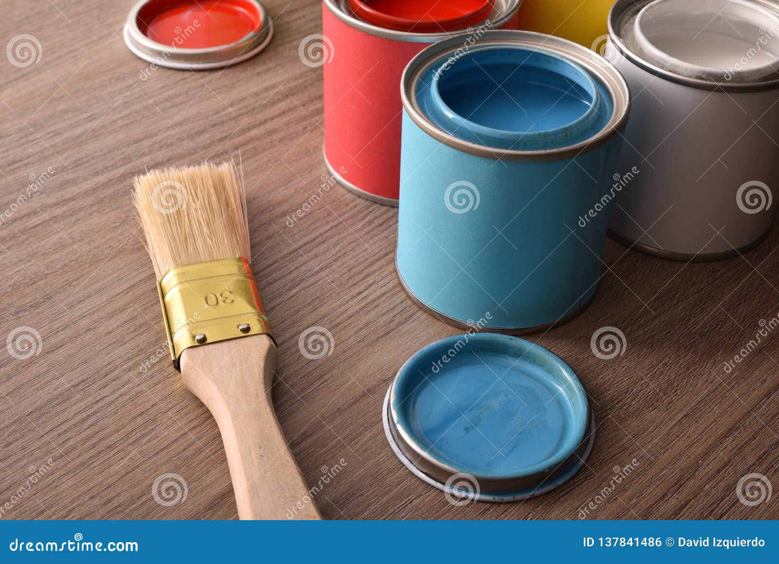 Assortment of Open Paint Cans on Table Elevated View Stock Photo ...