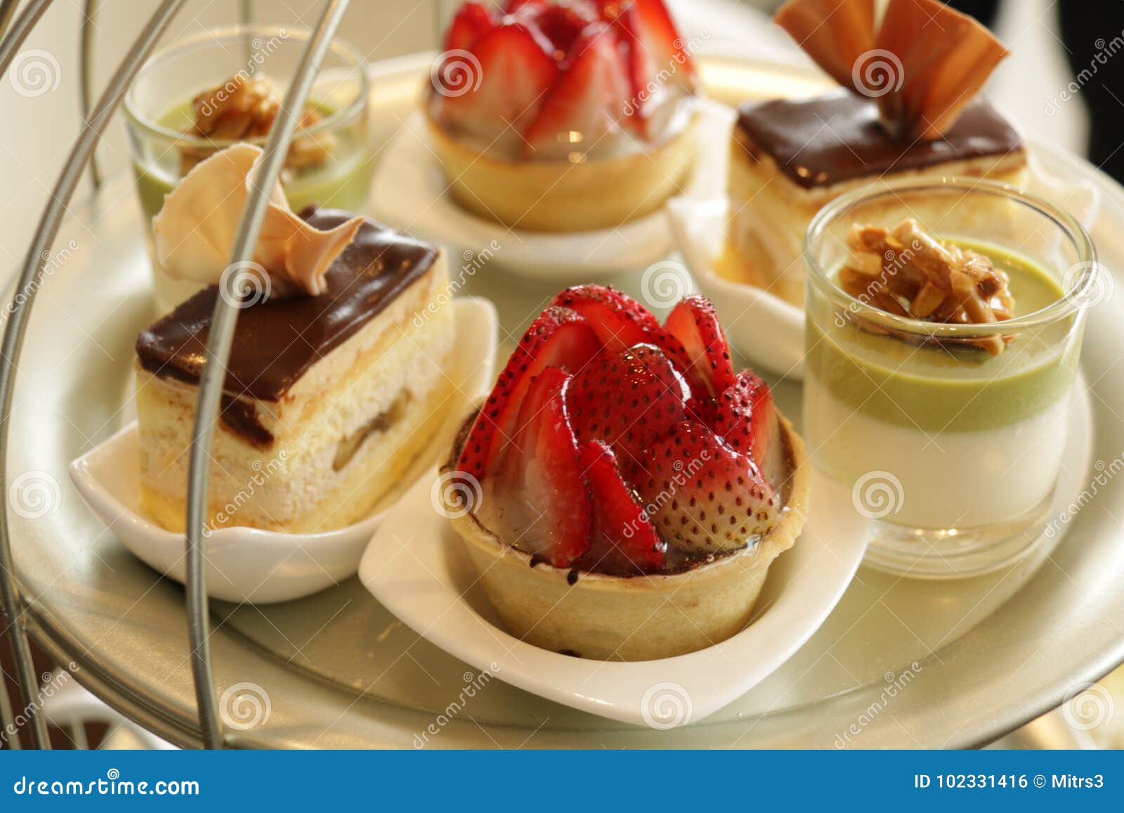 Assortment of Pieces of Cake in Plate Stock Photo - Image of tart ...