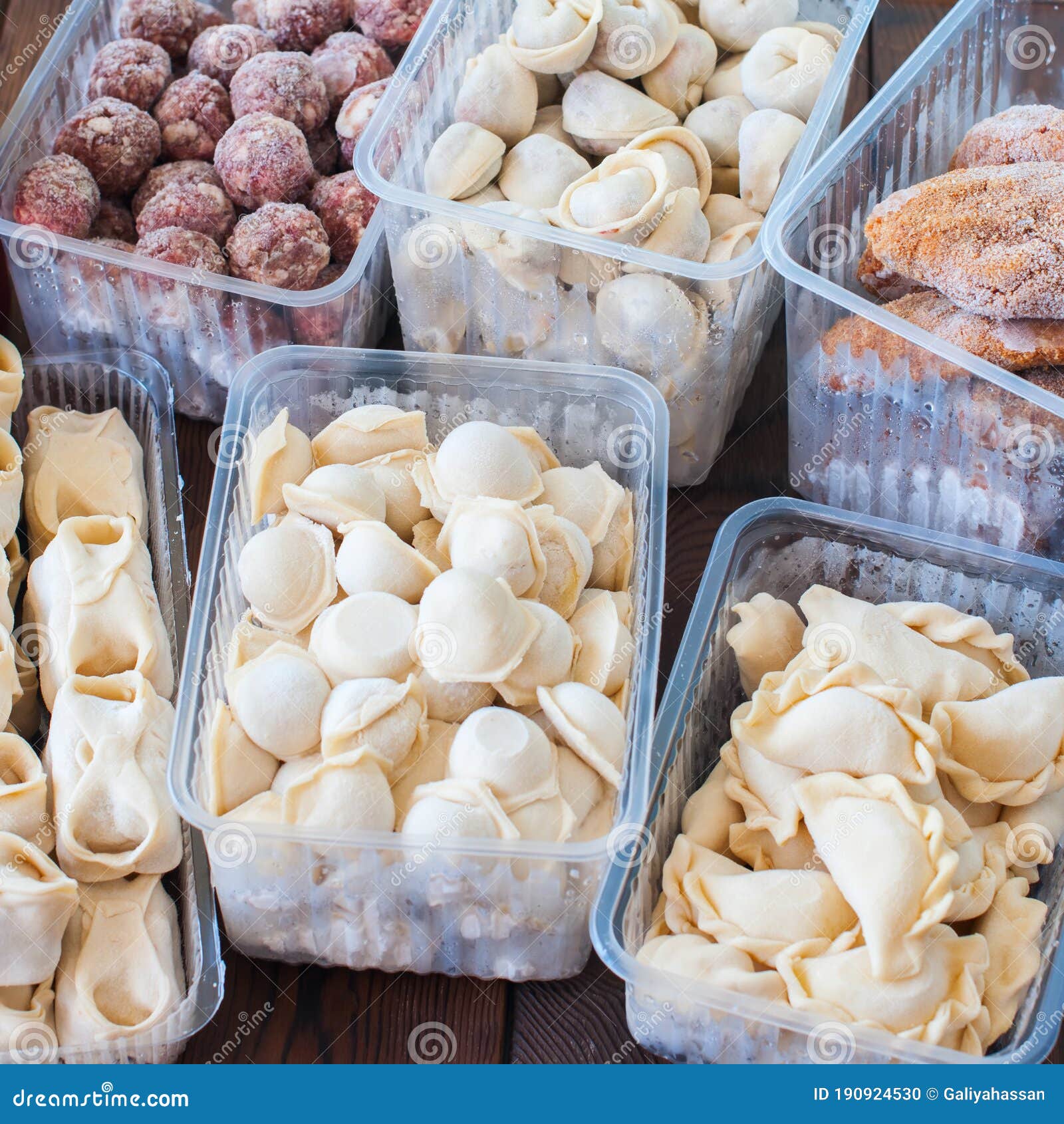 Assortment of Pocket Items. Semifinished Meatballs, Dumplings, Pierogi ...
