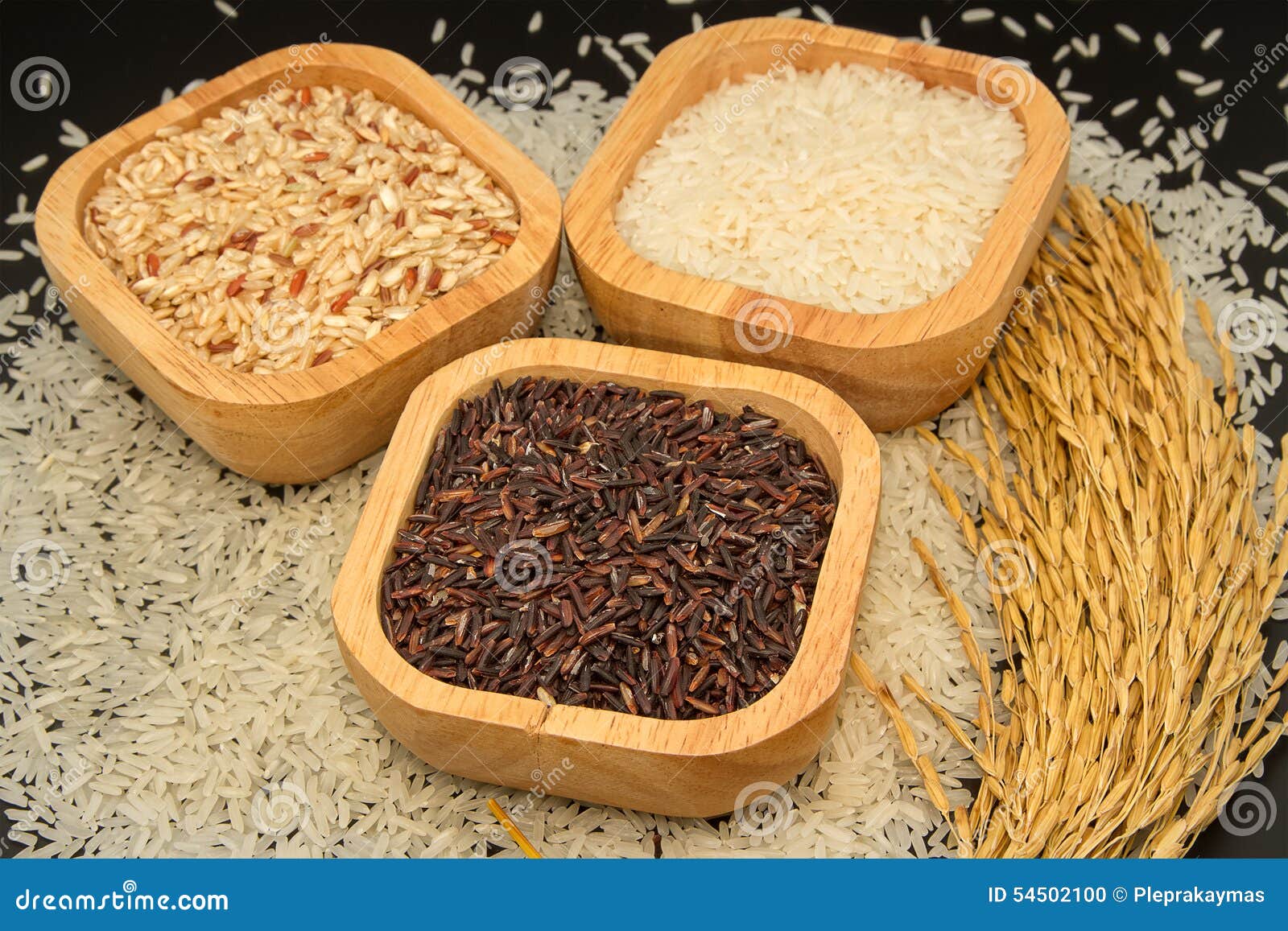 Assortment of Rice in Wooden Bowl Stock Photo - Image of dryness ...