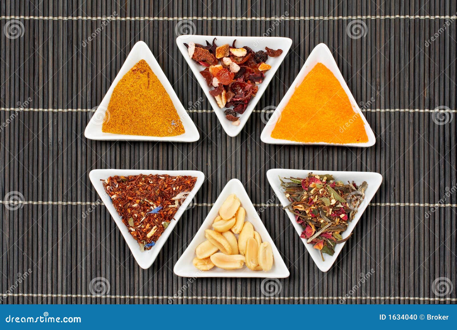 Assortment of Spices Over a Bamboo Mat Stock Photo - Image of curry ...