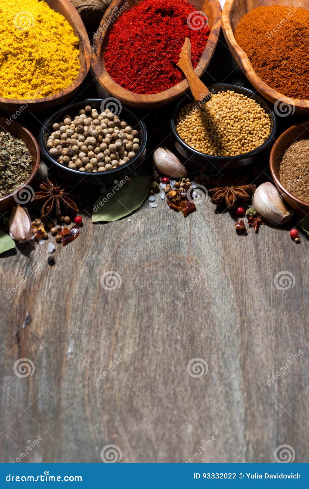 Assortment of Spices on a Wooden Background, Vertical Stock Photo ...