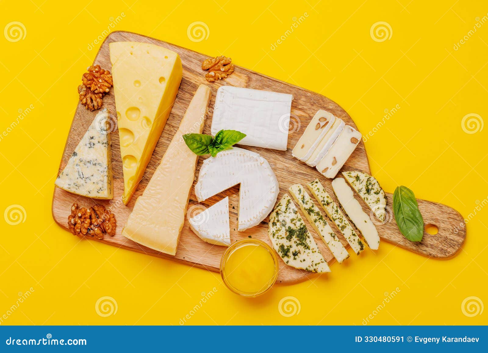 An Assortment of Various Cheeses Arranged on a Board, Highlighting ...