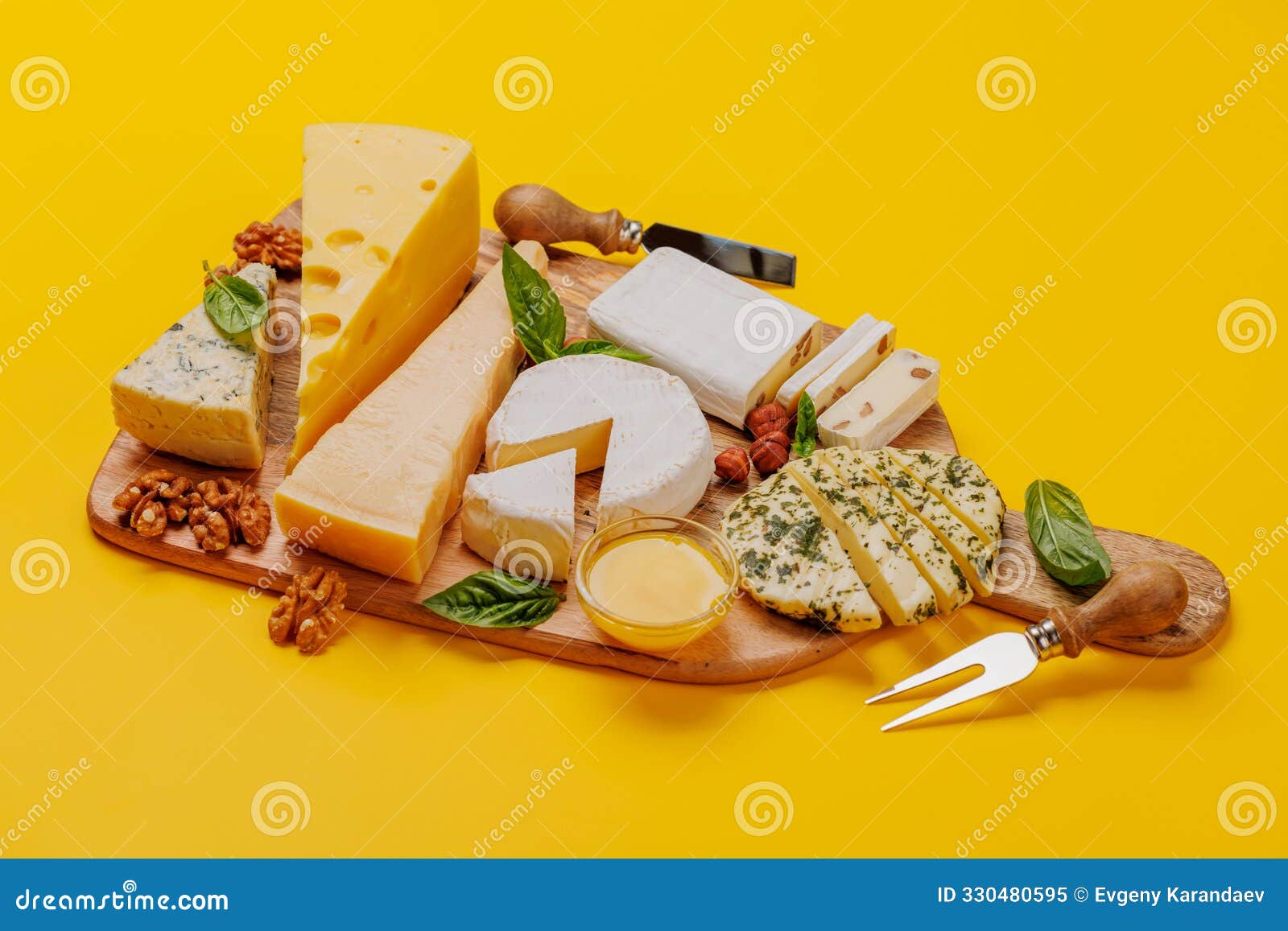 An Assortment of Various Cheeses Arranged on a Board, Highlighting ...