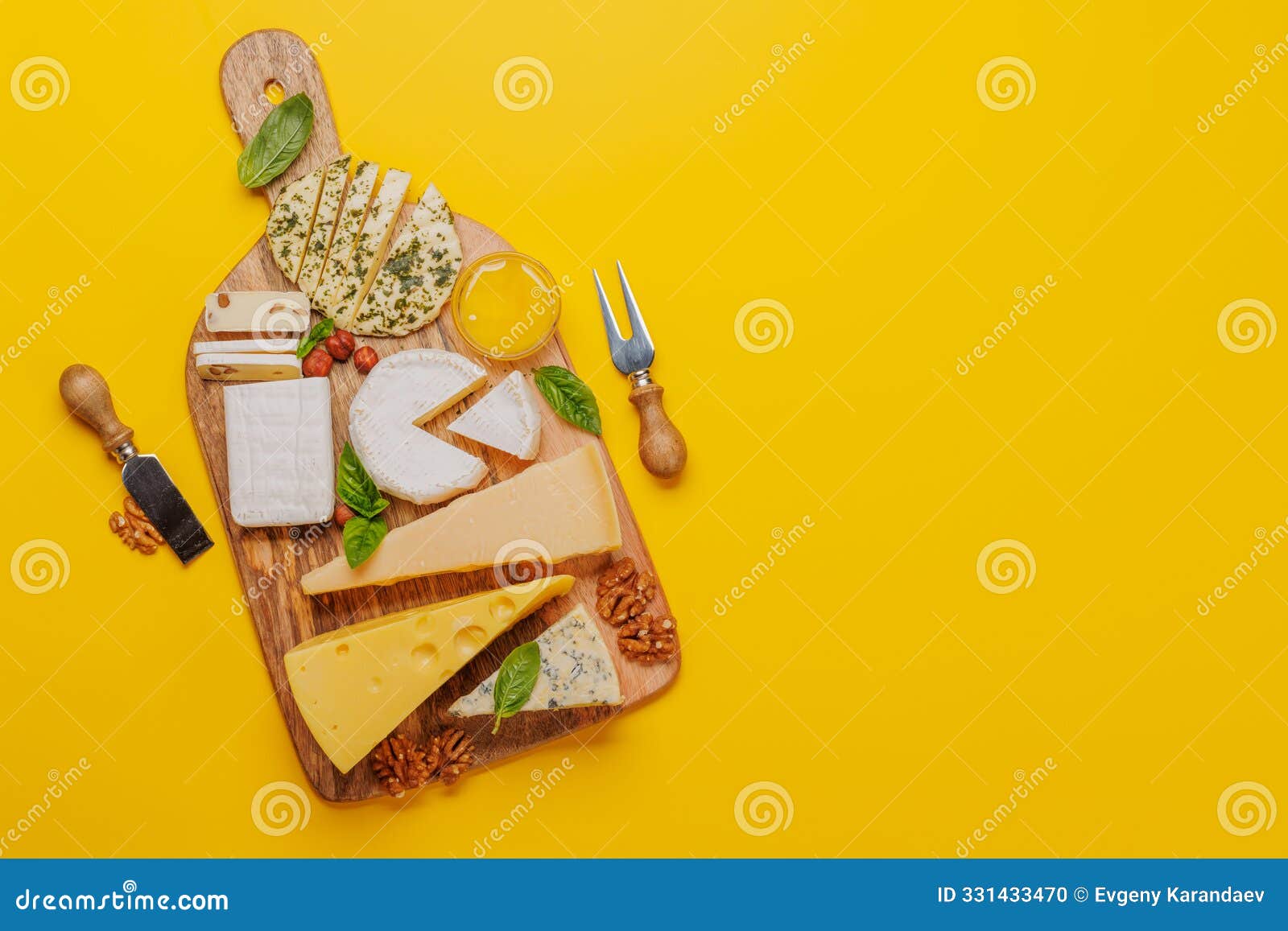 An Assortment of Various Cheeses Arranged on a Board, Highlighting ...