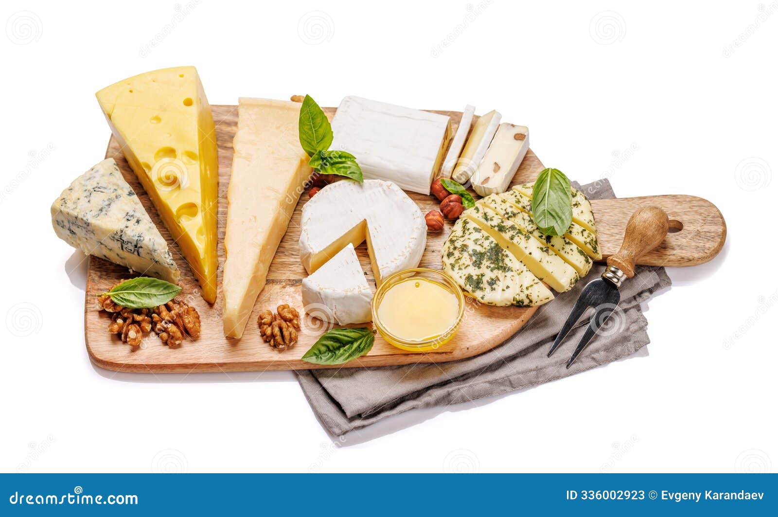 An Assortment of Various Cheeses Arranged on a Board, Highlighting ...