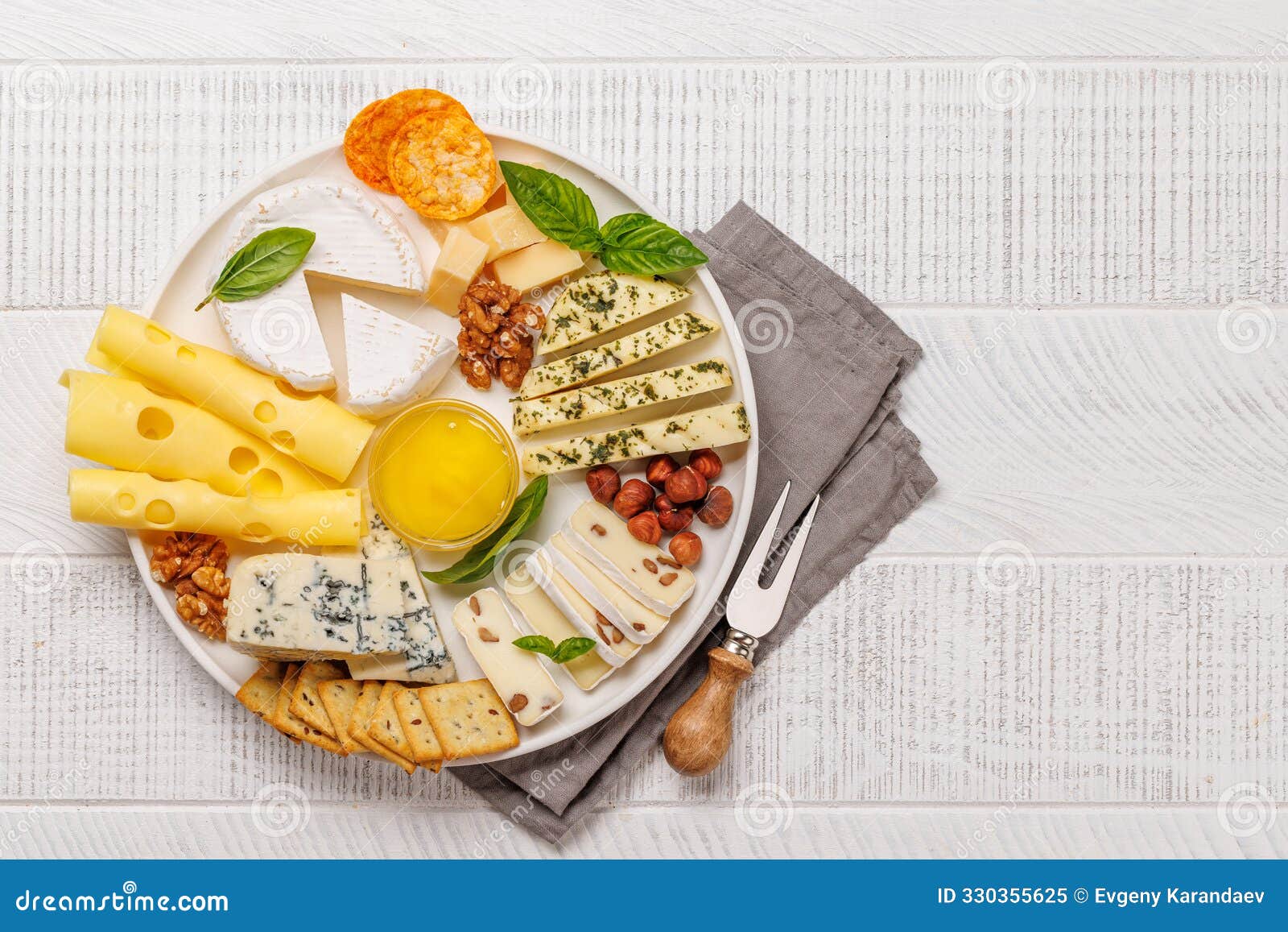 An Assortment of Various Cheeses Arranged on a Plate, Highlighting ...