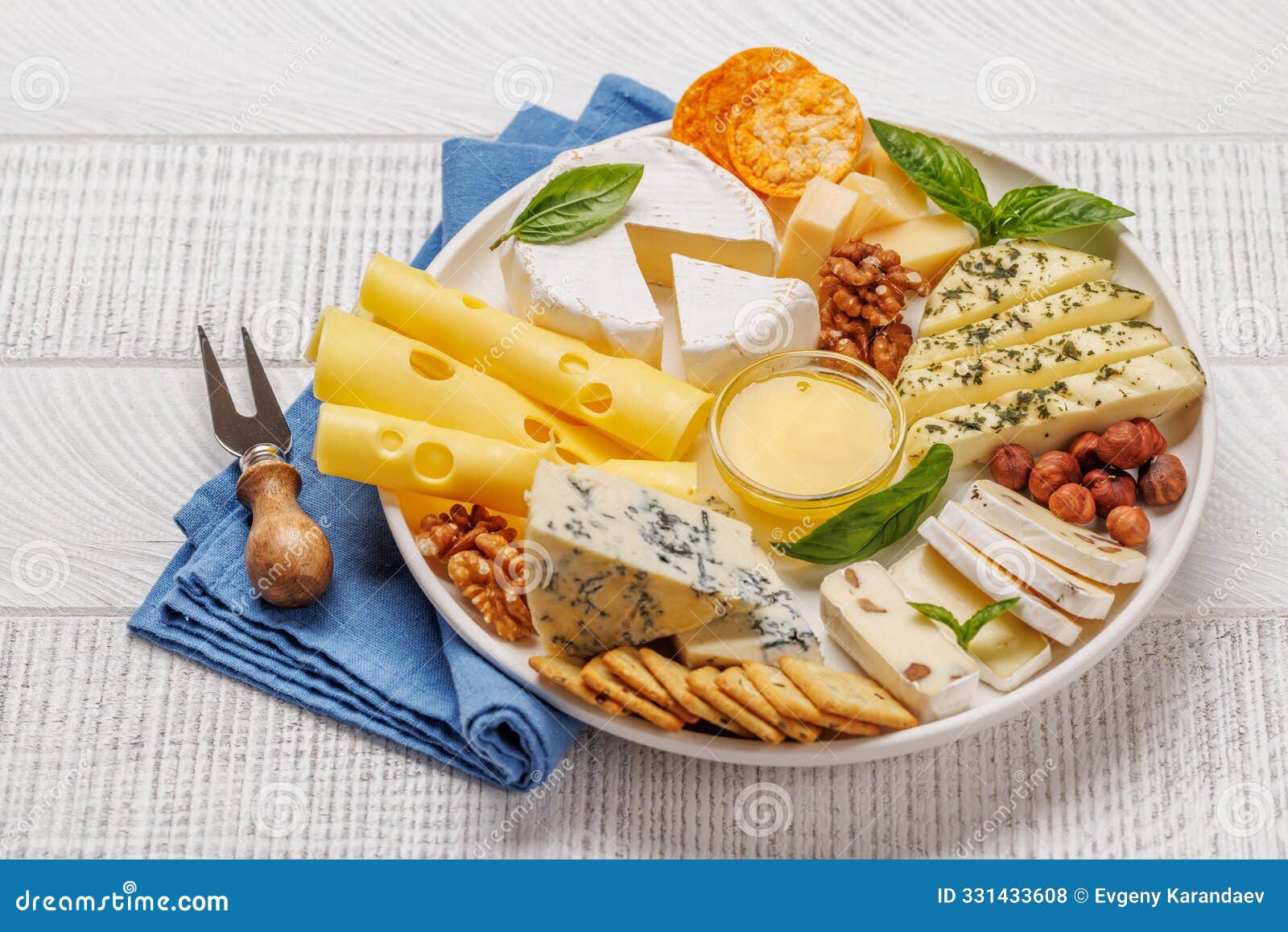 An Assortment of Various Cheeses Arranged on a Plate, Highlighting ...
