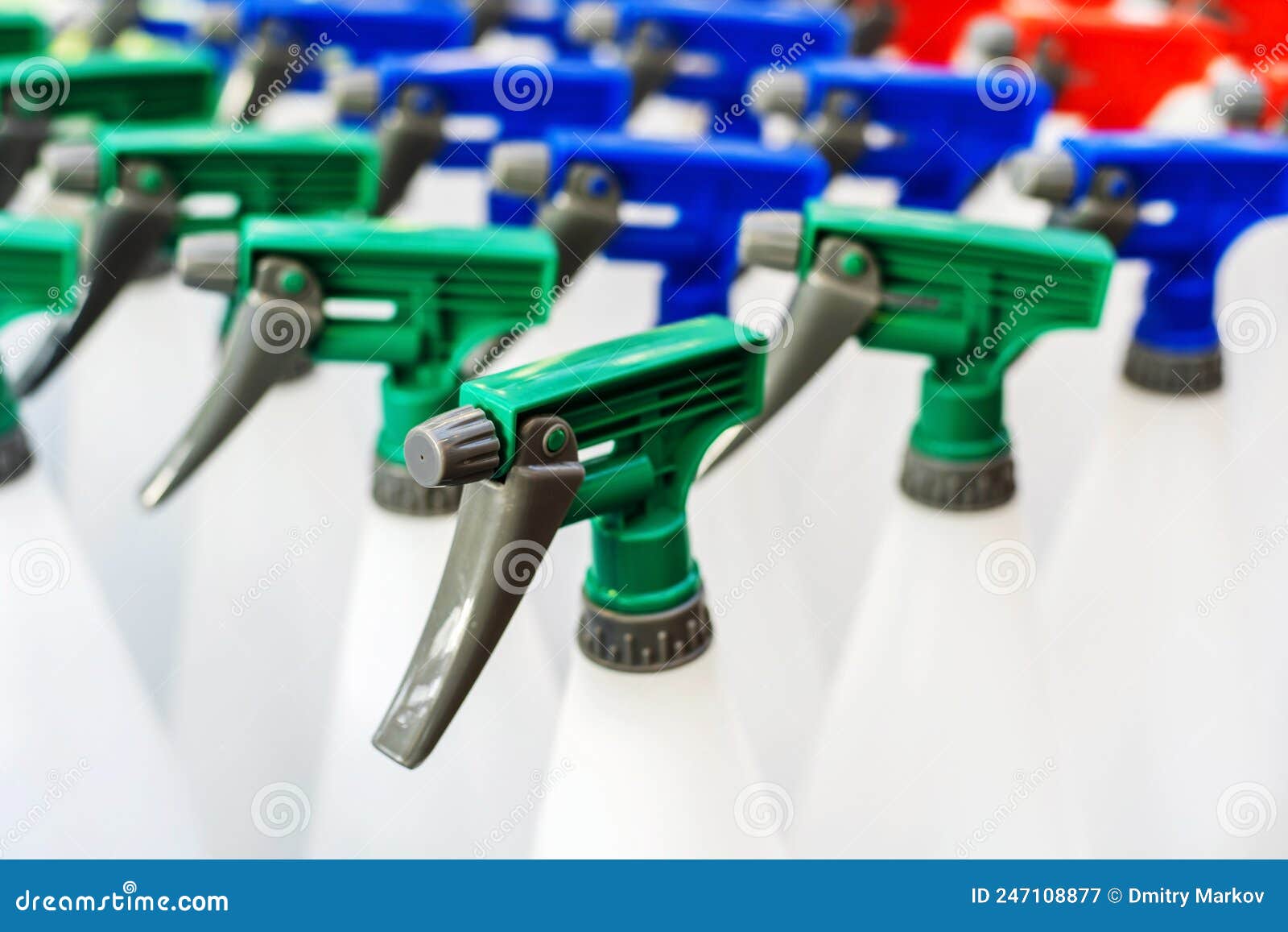 An Assortment of Water Sprayers for Watering Plants on the Counter in ...