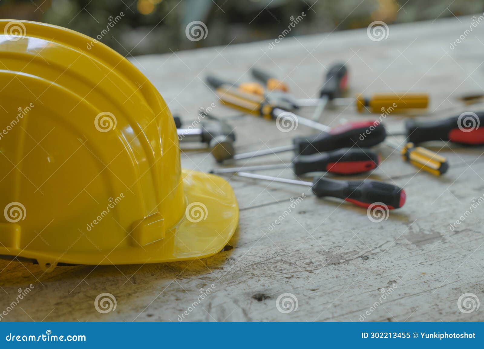 Assortment of Well-used Hand Tools Spread Out on a Worn Wooden Surface ...