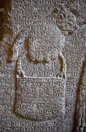 Assyrian Wall Carving with Cuneiform Writing Stock Photo - Image of ...