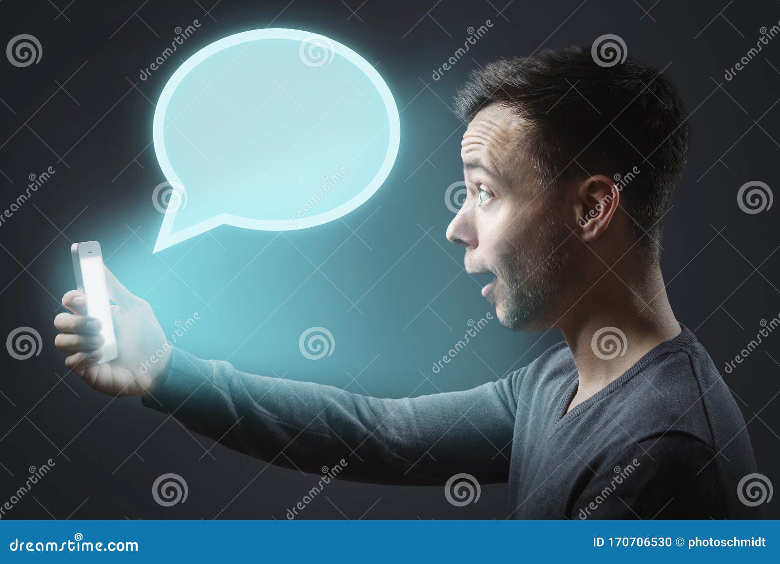 Astonished Man Getting a Message on His Smartphone Stock Photo - Image ...