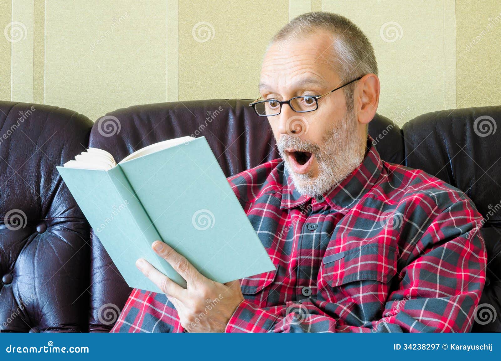 Astonished Senior Man Reading a Book Stock Image - Image of professor ...