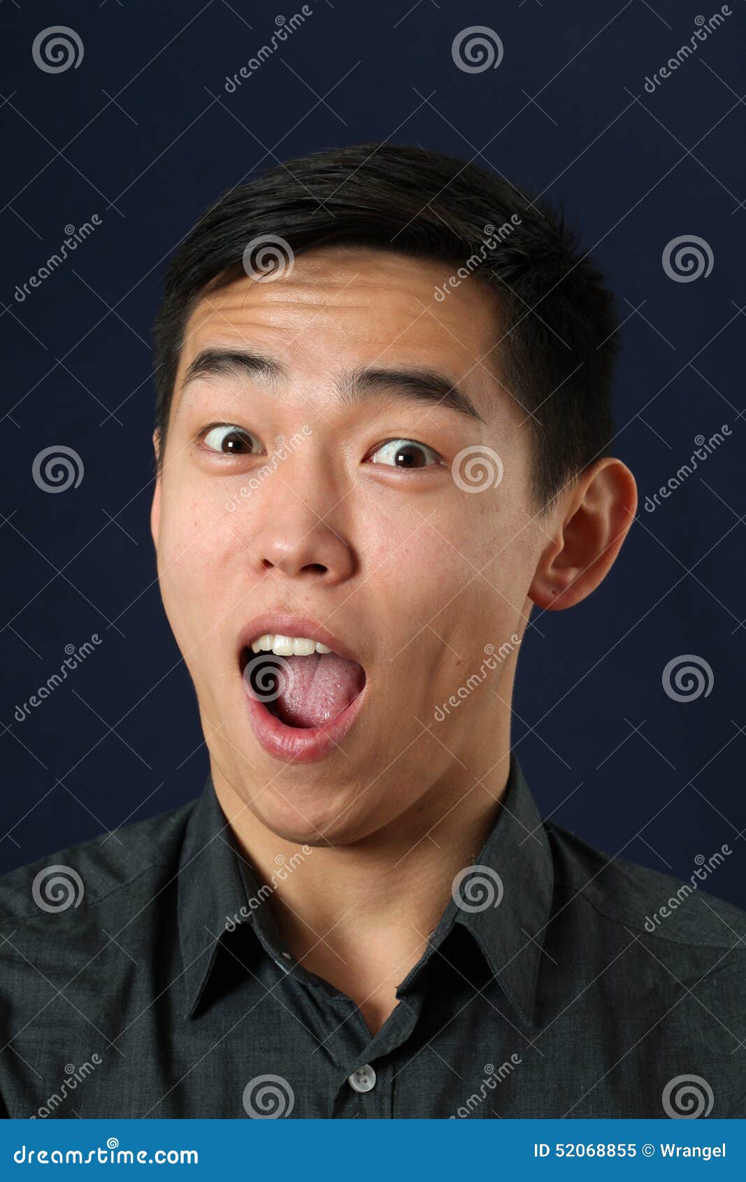 Astonished Young Asian Man Looking at Camera Stock Image - Image of ...
